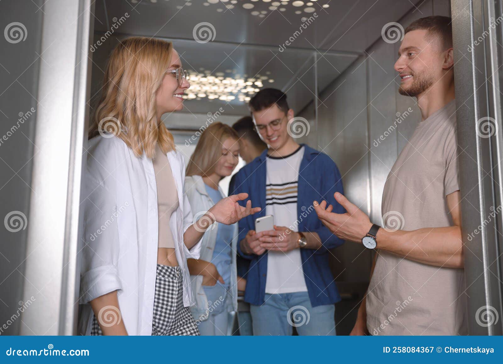 Group of Young People in Modern Elevator Stock Image - Image of female ...