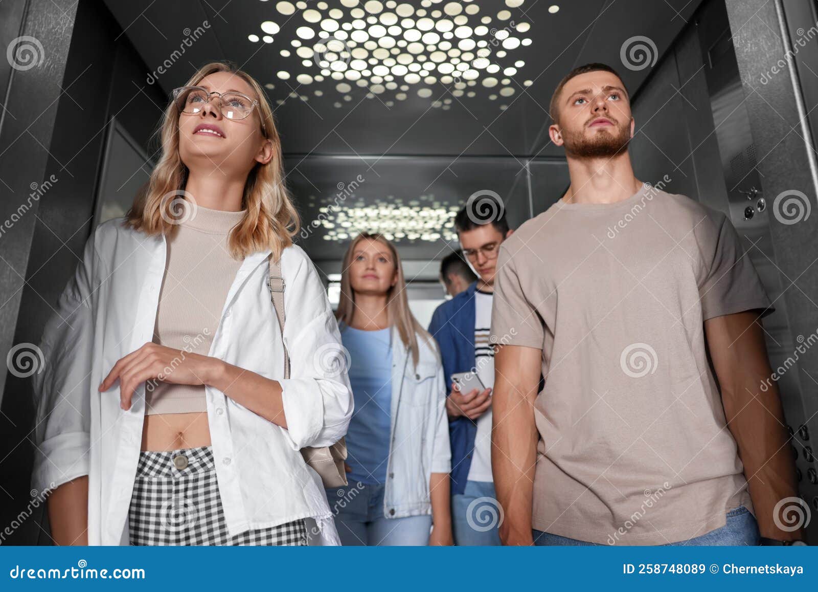 Group of Young People in Modern Elevator Stock Image - Image of indoors ...