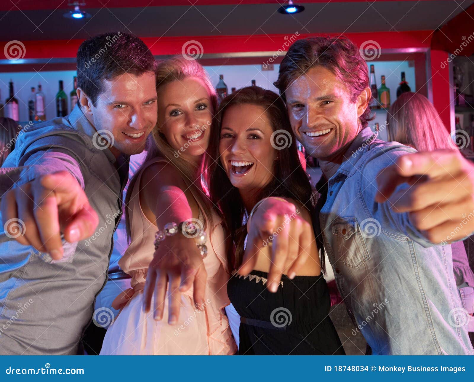 Group of Young People Having Fun in Busy Bar Stock Photo - Image of ...