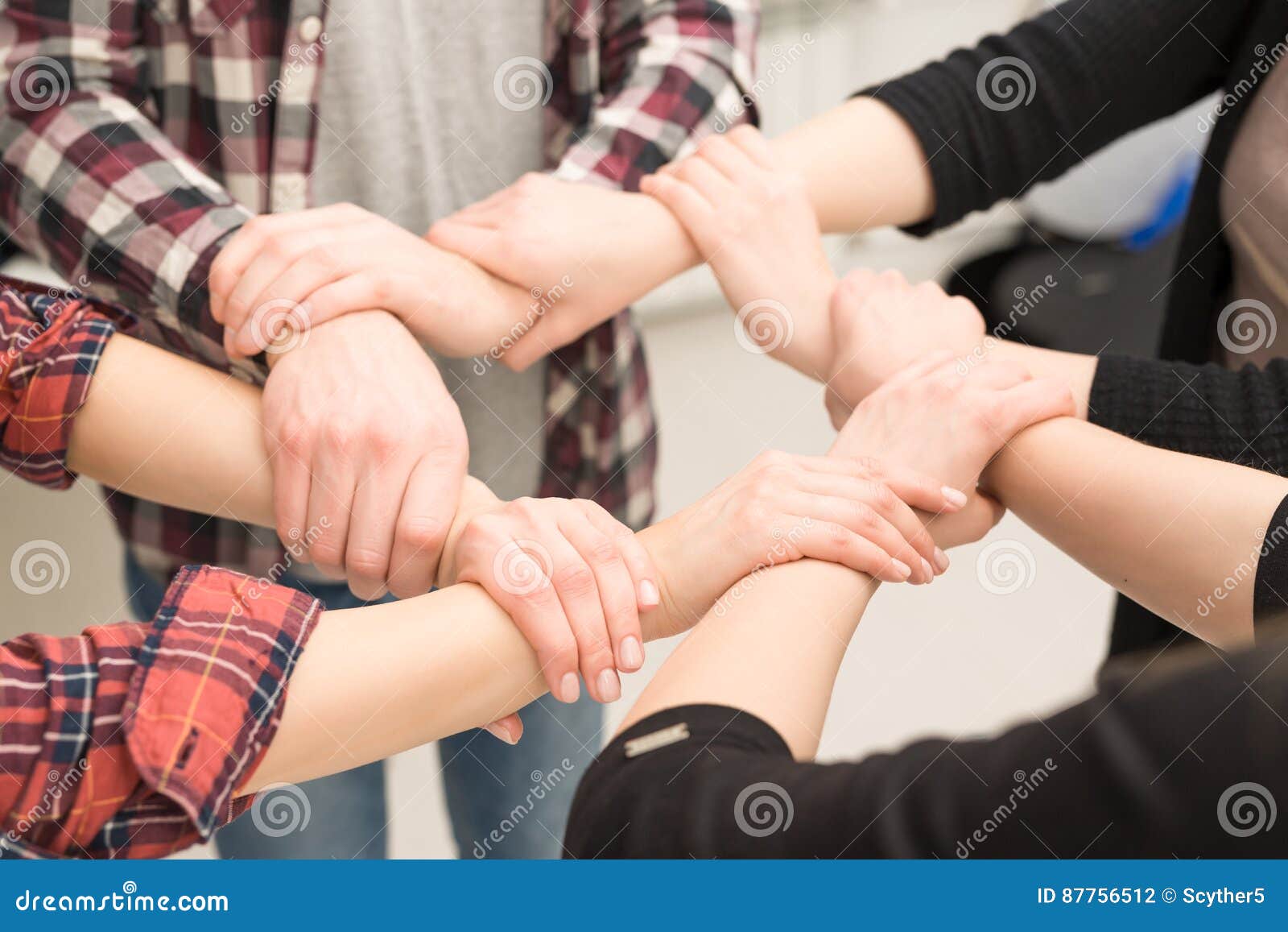 A Group of Young People Hold Strong Hands. Stock Photo - Image of ...