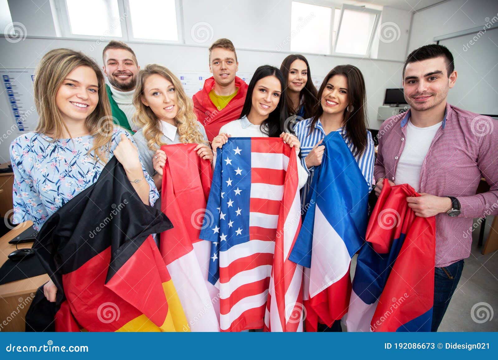 Group of Young People Holding International Flags of Many Countries in ...