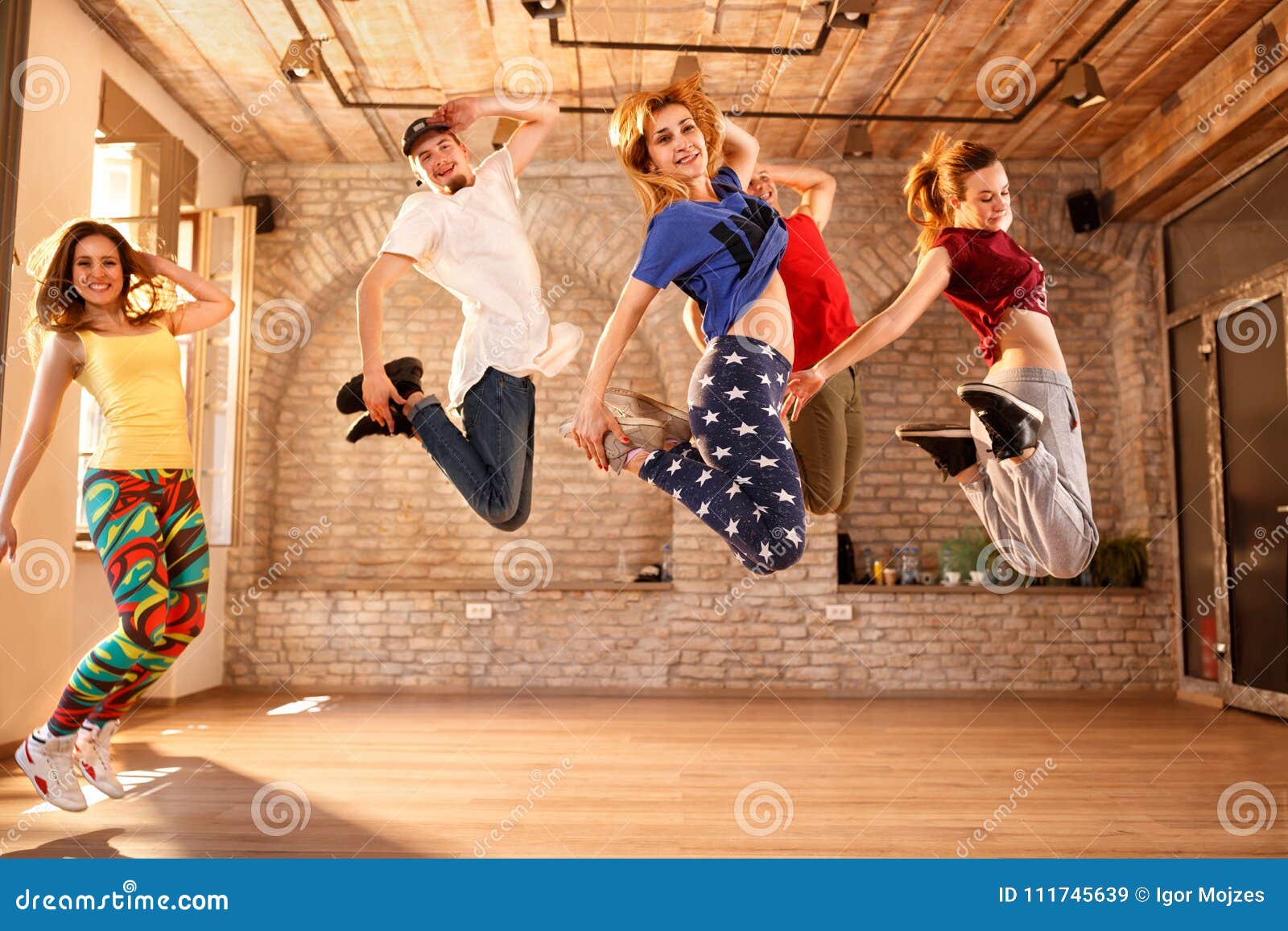 Group of Young People Jumping Together Stock Image - Image of cool ...