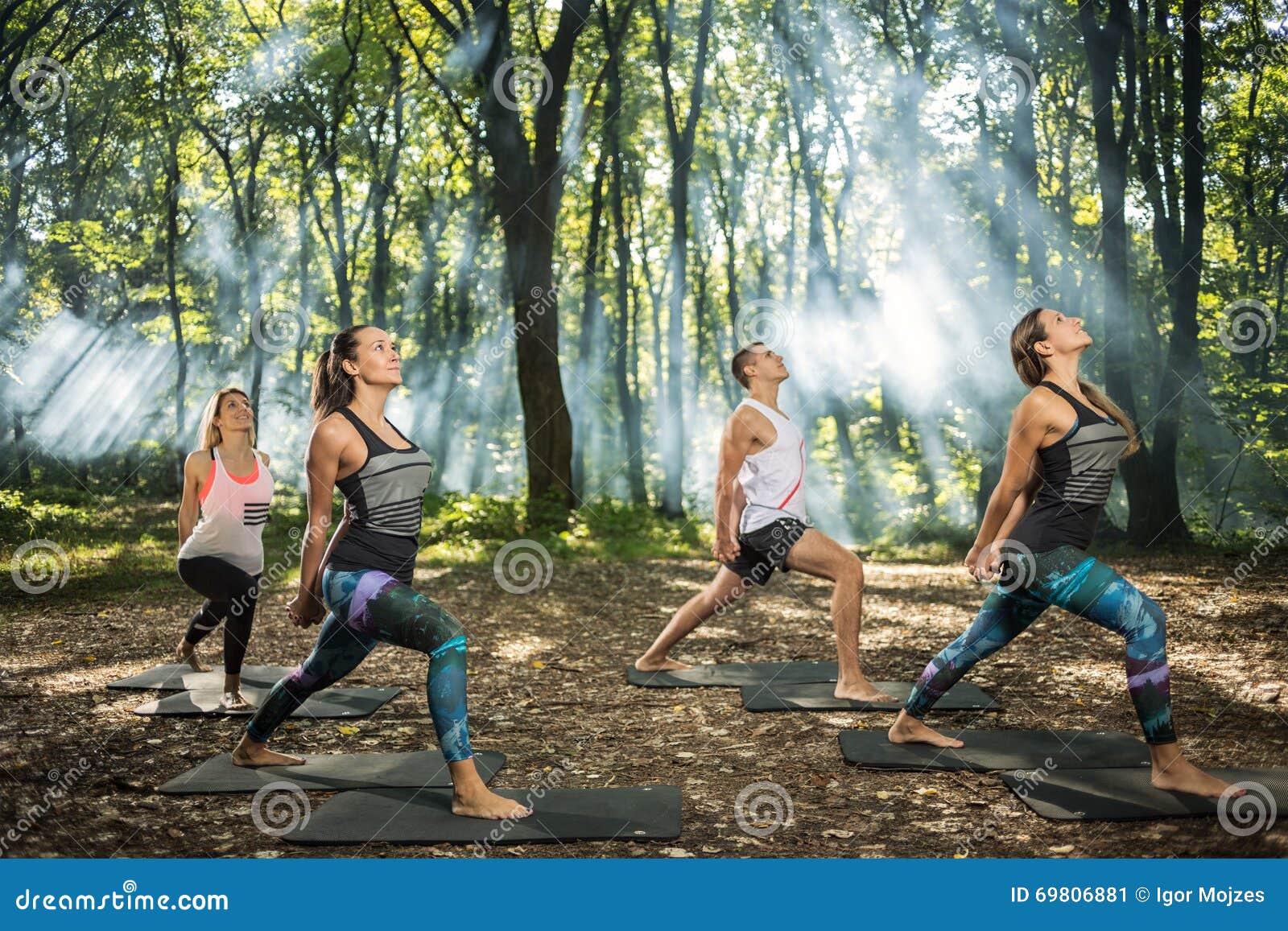 Group of Young People Keep in Shape Exercising in Forest Stock Image ...