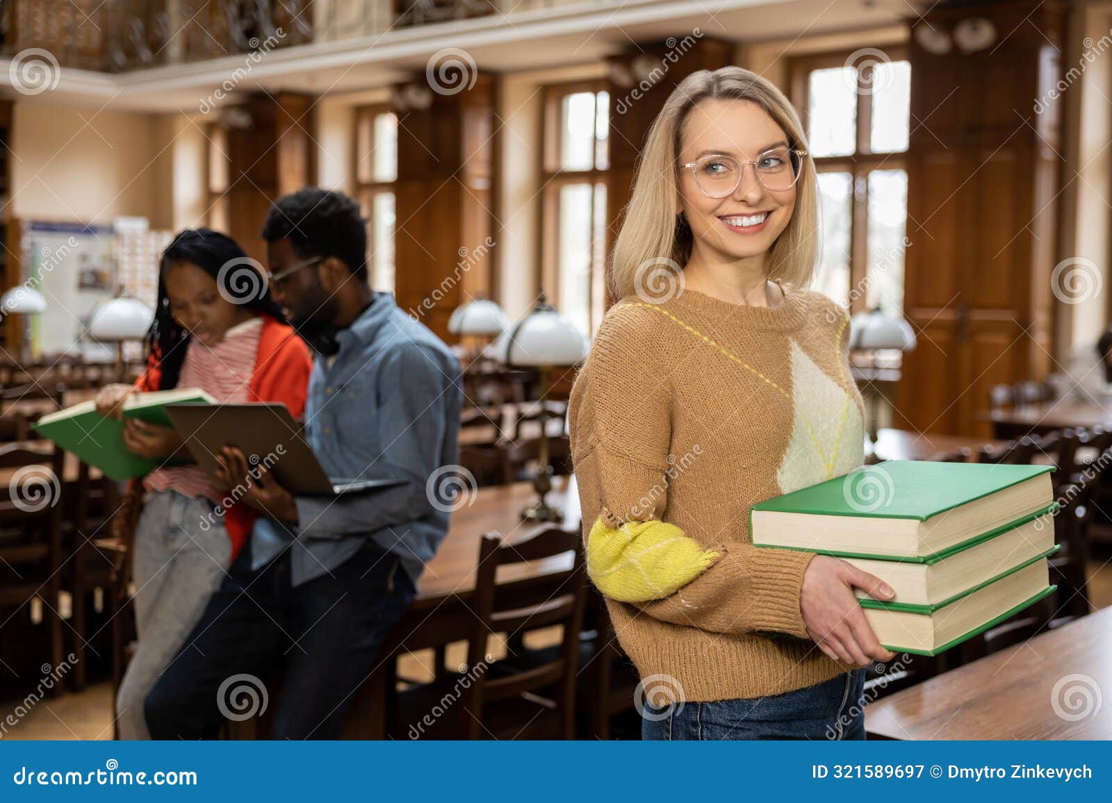 Group of Young People in the Library Looking Busy and Involved Stock ...