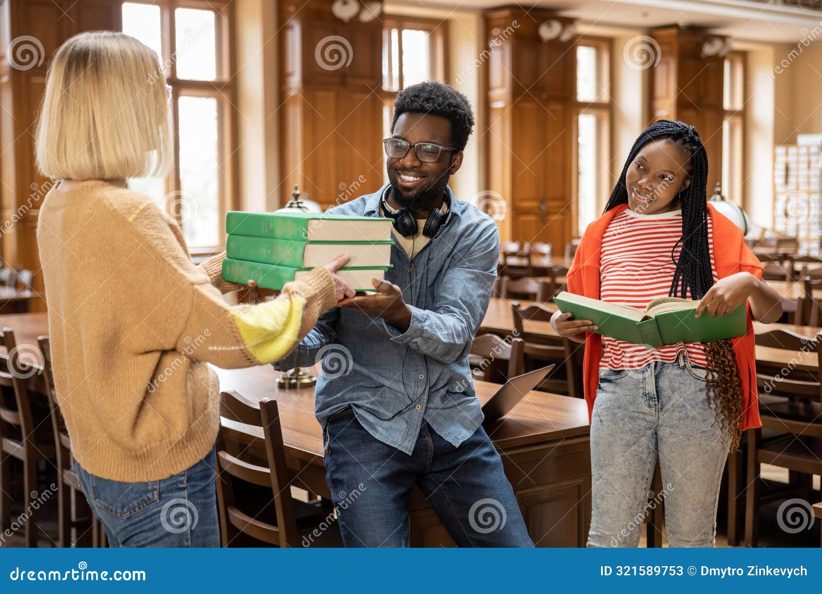 Group of Young People in the Library Looking Busy and Involved Stock ...