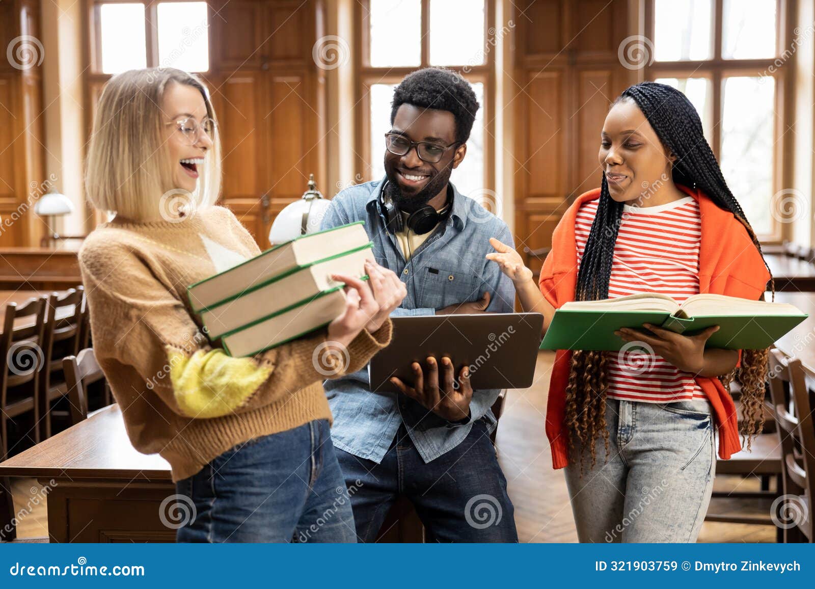 Group of Young People in the Library Looking Busy and Involved Stock ...