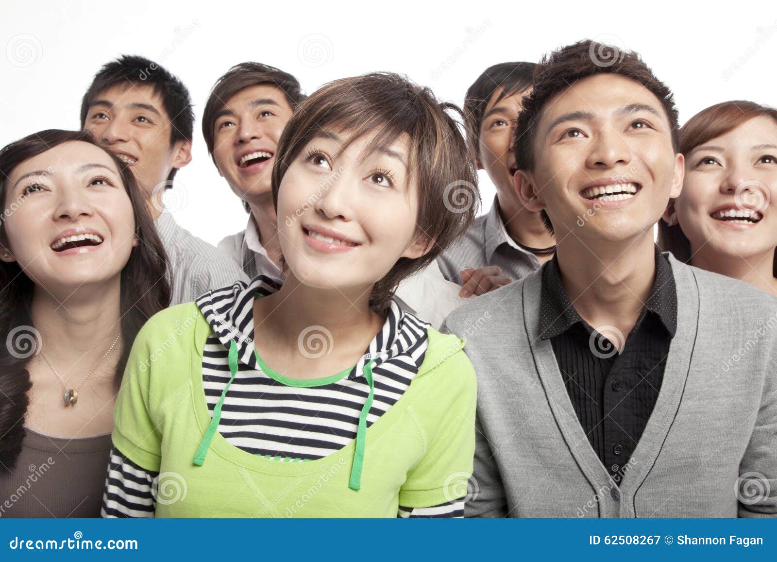 A Group of Young People Looking Up in Excitement Stock Image - Image of ...