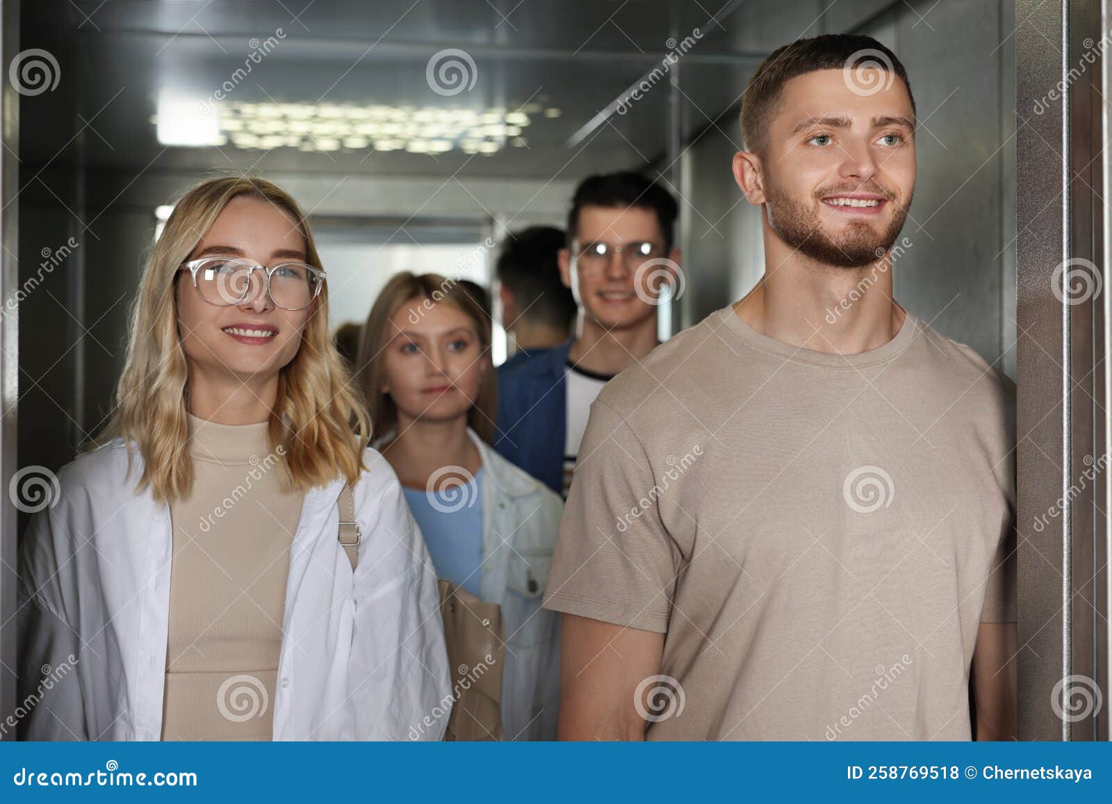Group of Young People in Modern Elevator Stock Photo - Image of male ...