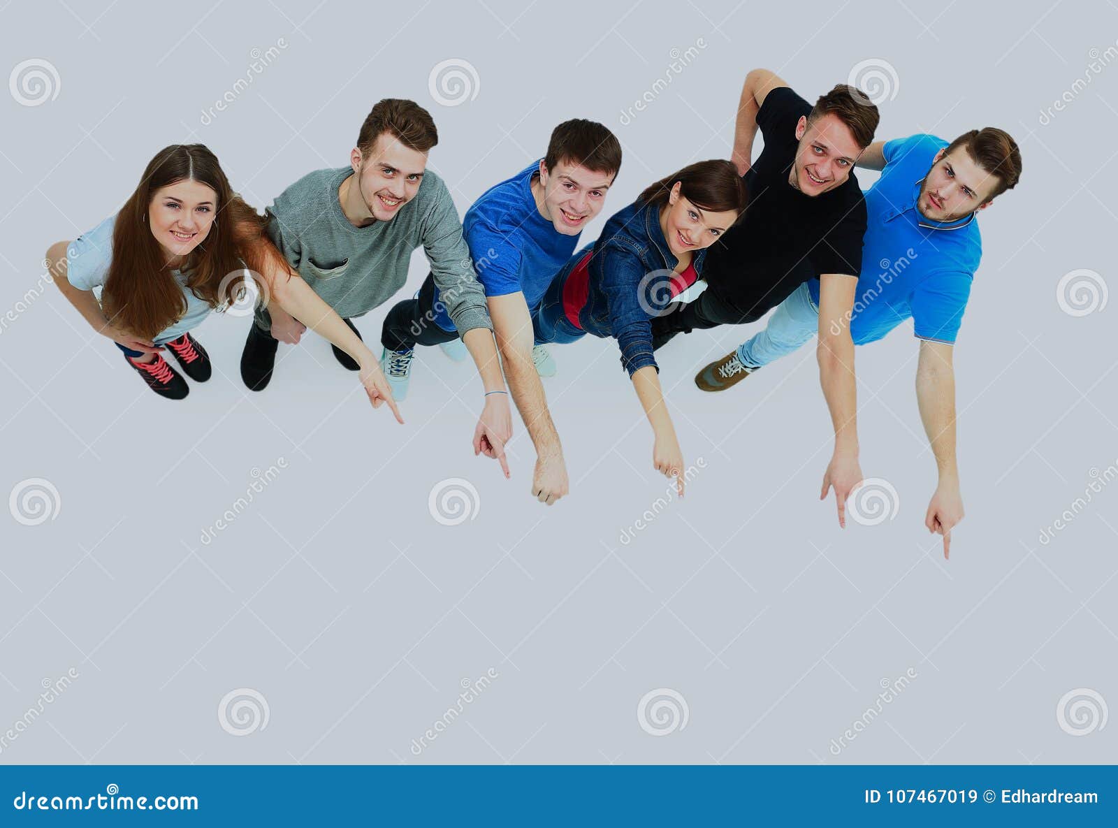 Group of Young People Pointing at Something. Stock Image - Image of ...