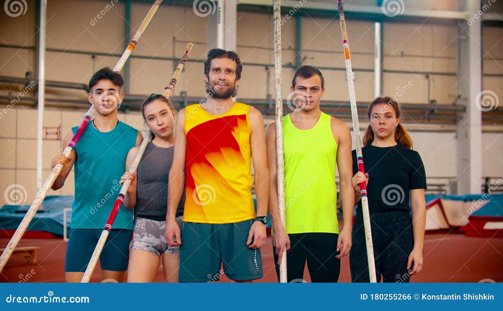 Group of Young People on the Pole Vault Training Looking in the Camera ...