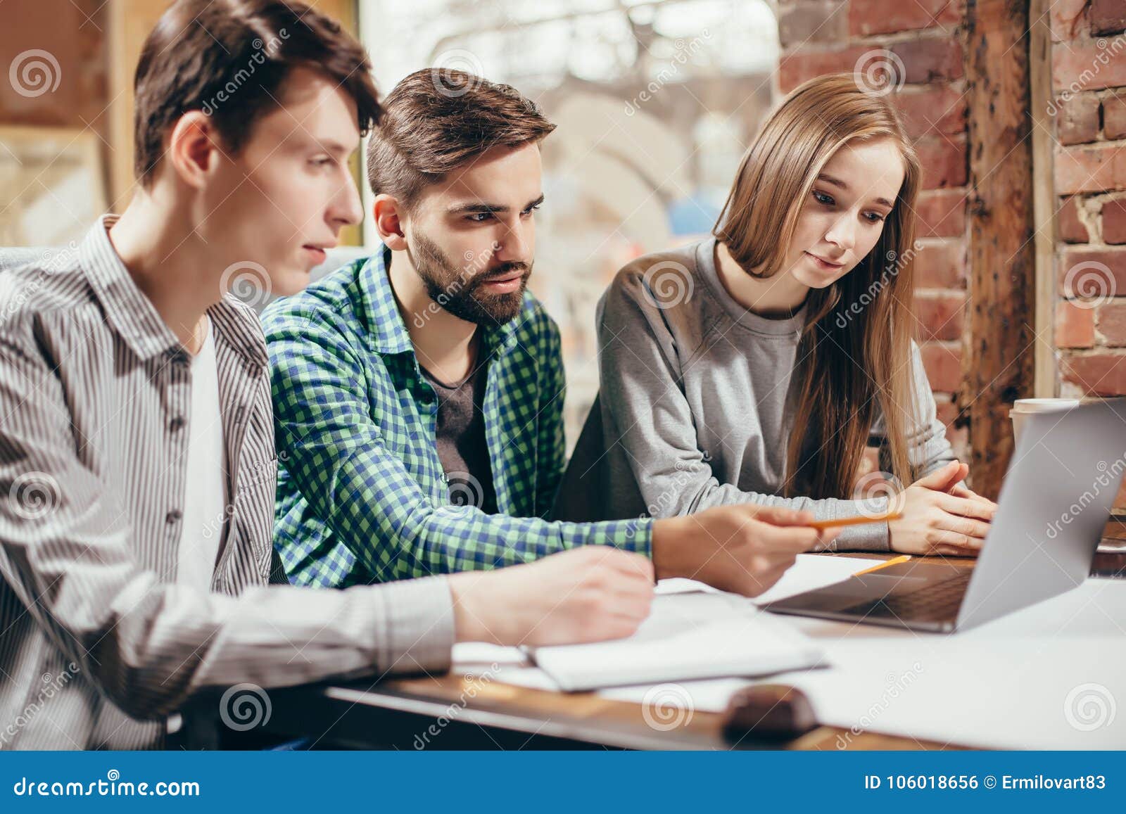 A Group of Young People Preparing for the Seminar in a Cafe. Stock ...