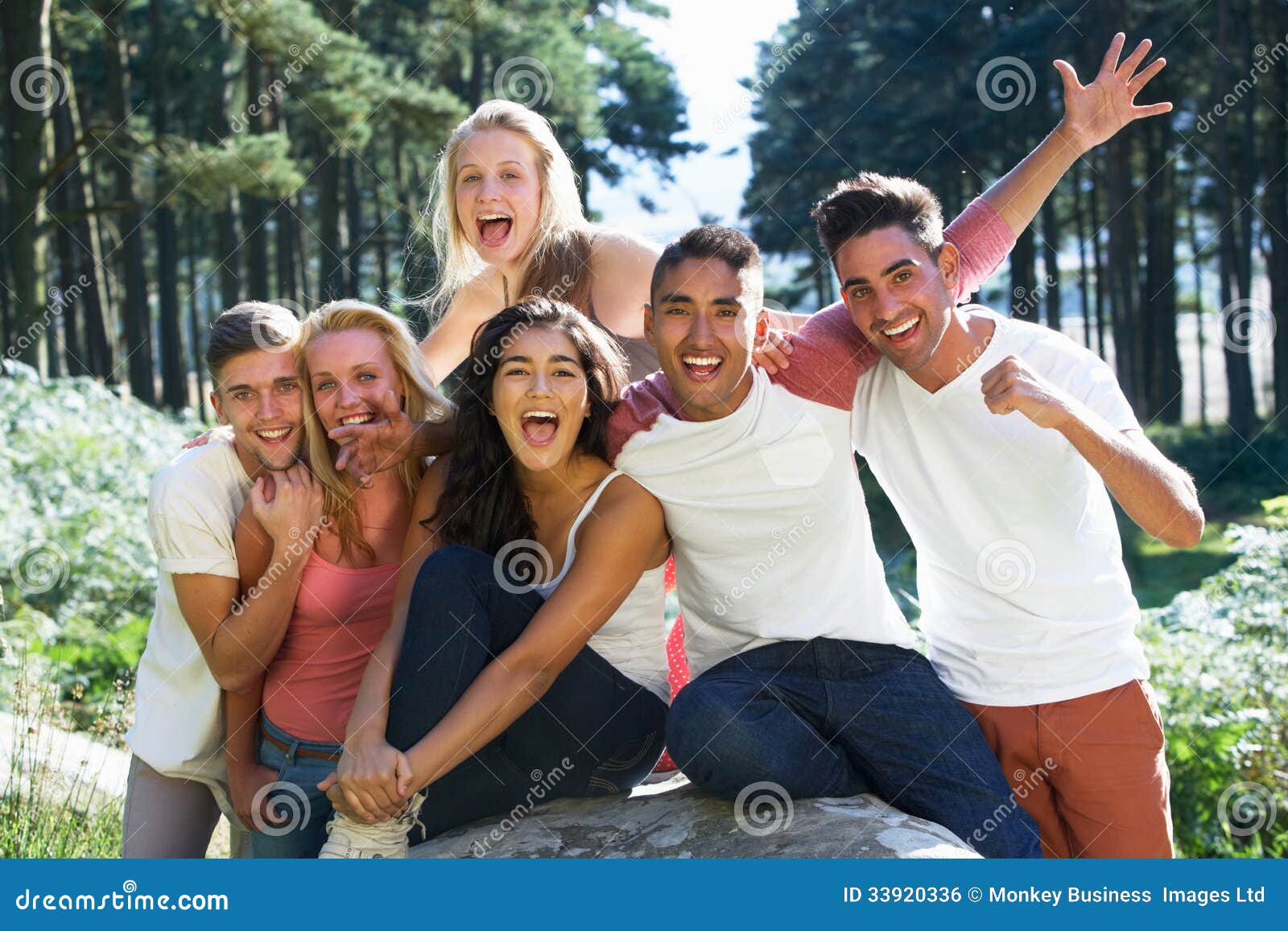 Group of Young People Relaxing in Countryside Stock Photo - Image of ...