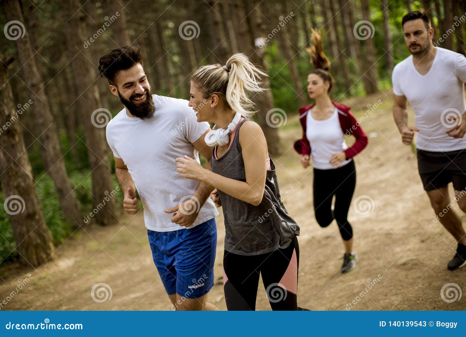 Group of Young People Run a Marathon through the Forest Stock Image ...