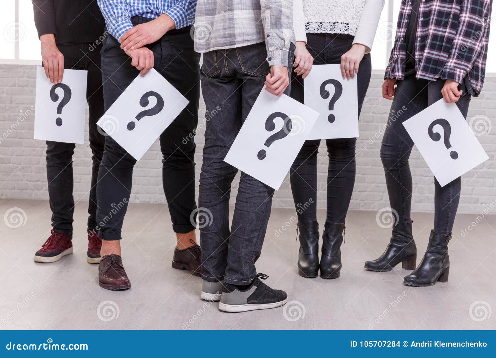 A Group of People are Shown Incompletely with Their Hands Down in Which ...