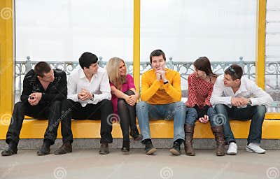 Group of young people sit stock image. Image of style - 4964197