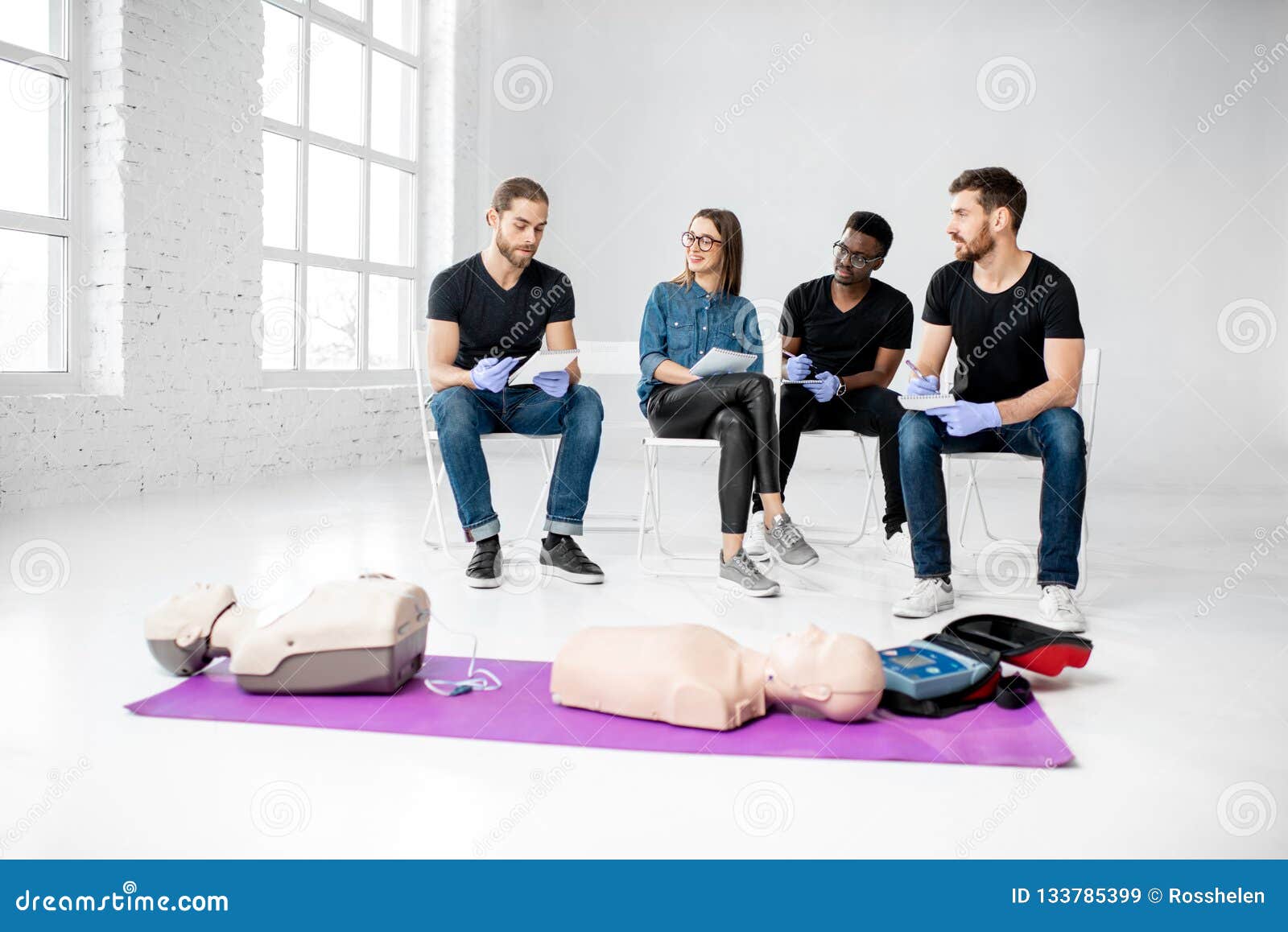Group of Young People Sitting during the First Aid Training Stock Image ...