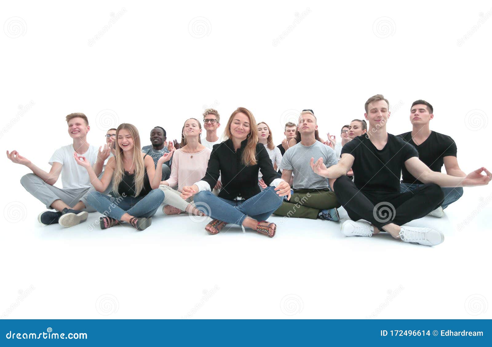 Group of Young People Sitting on the Floor in a Spacious Hall. Stock ...