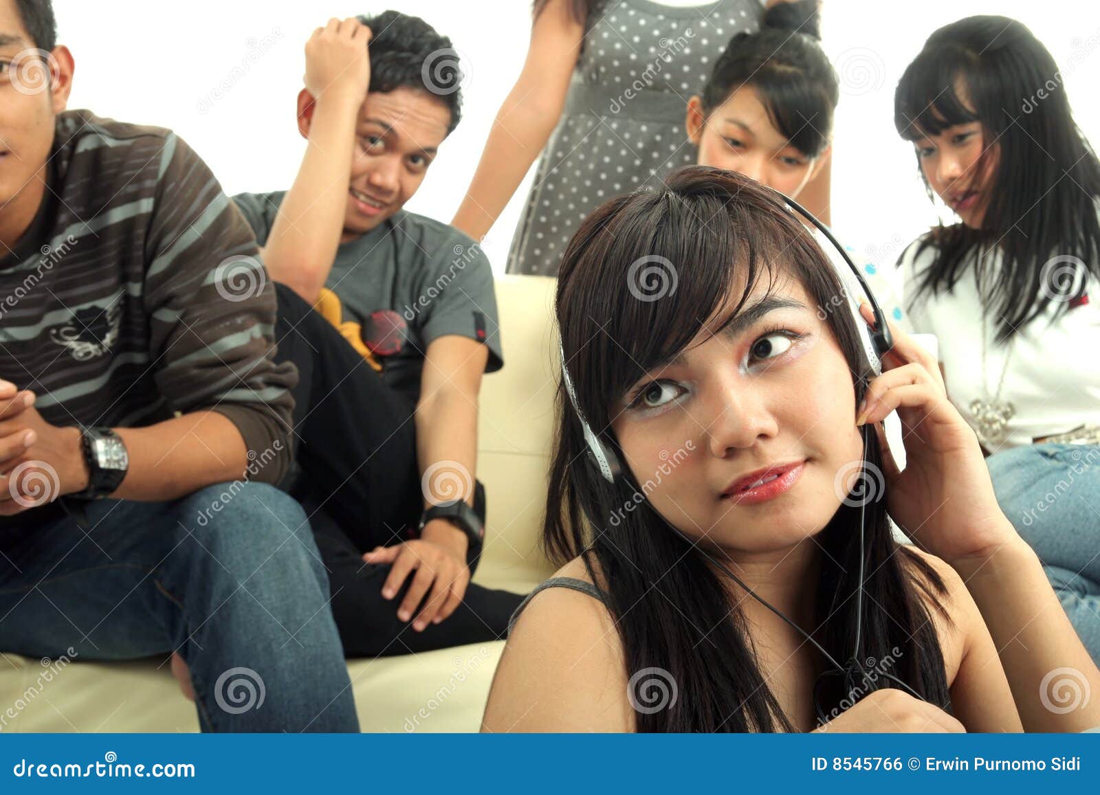Group of Young People on Sofa Stock Photo - Image of five, peoples: 8545766