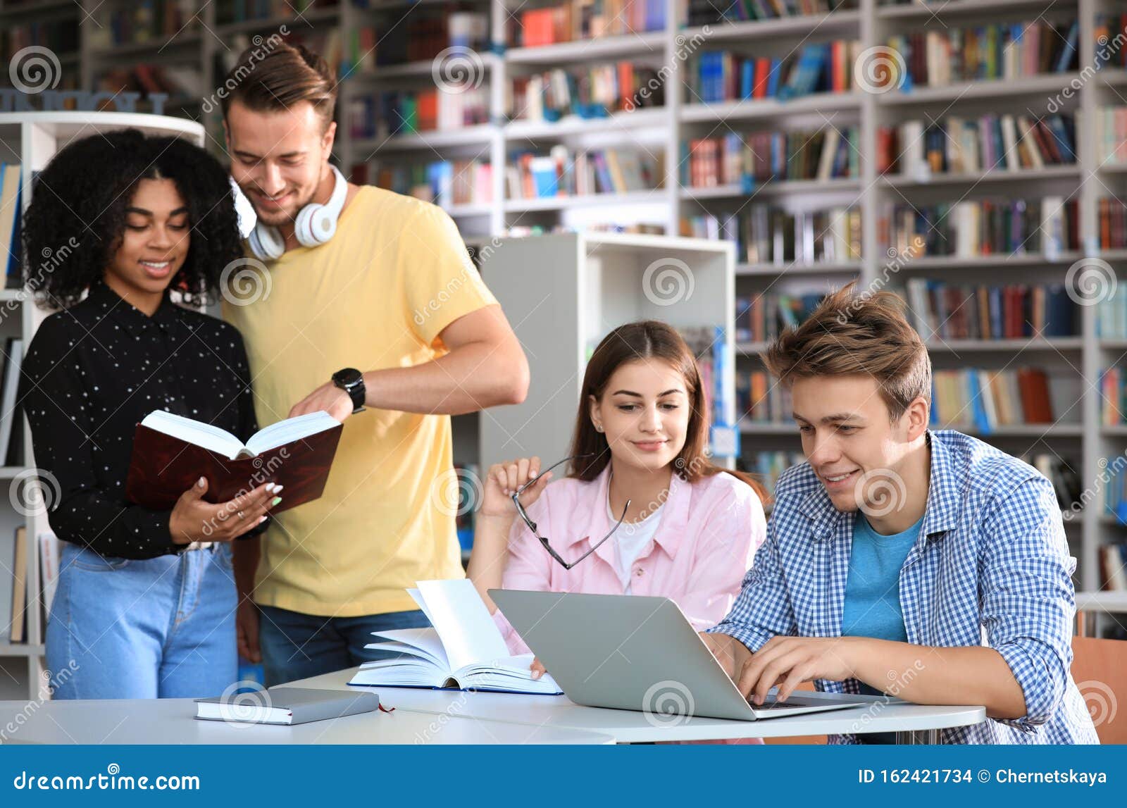 Group of Young People Studying at Table Stock Photo - Image of ...