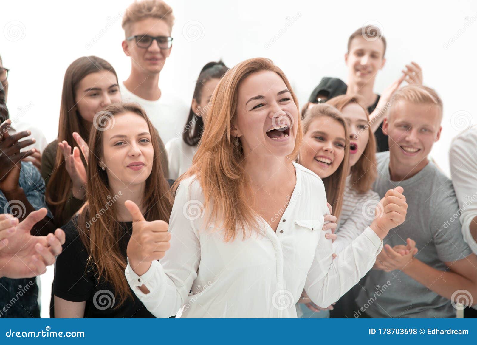Group of Young People Supporting Their Happy Leader Stock Photo - Image ...