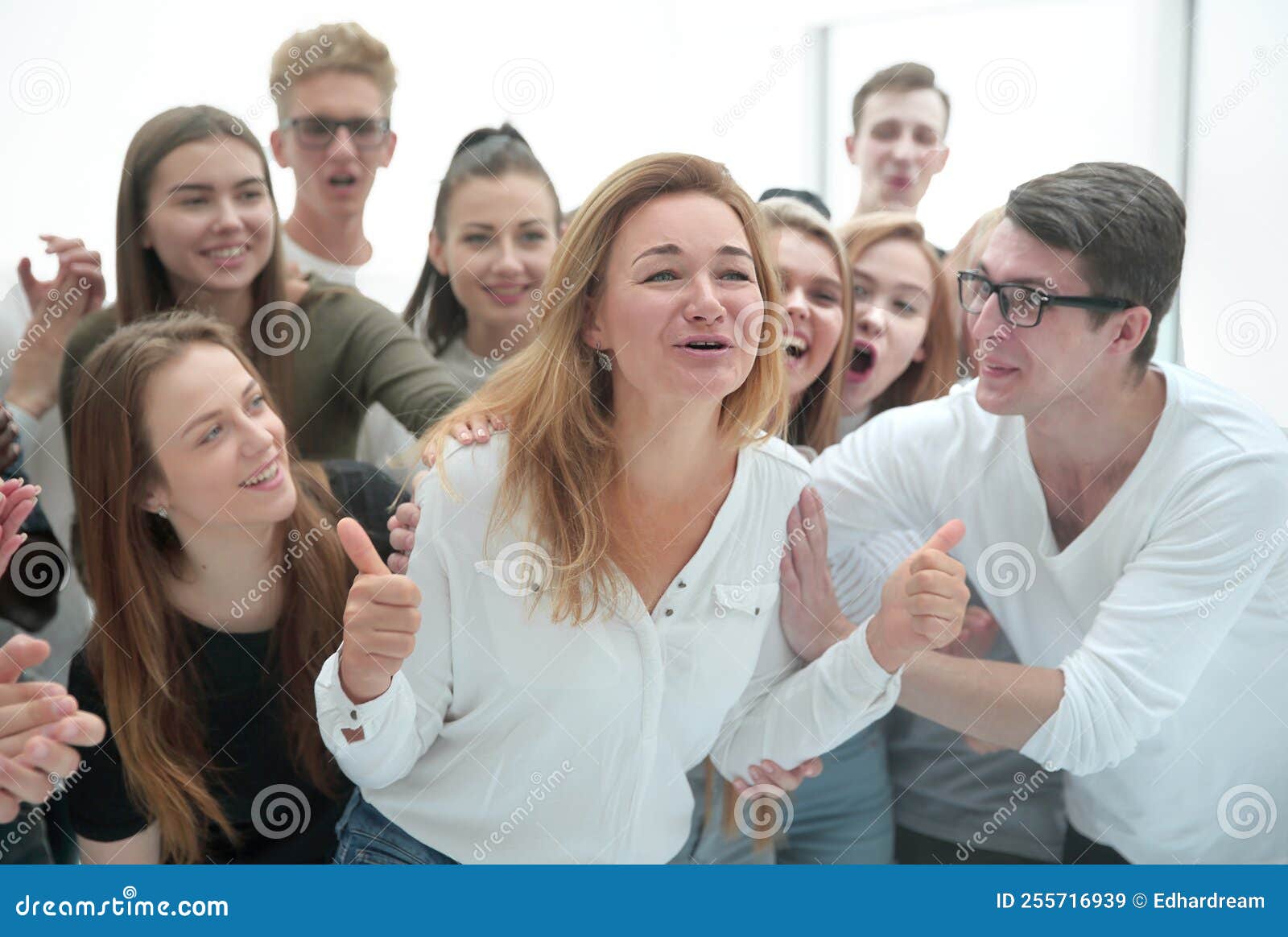 Group of Young People Supporting Their Happy Leader Stock Image - Image ...