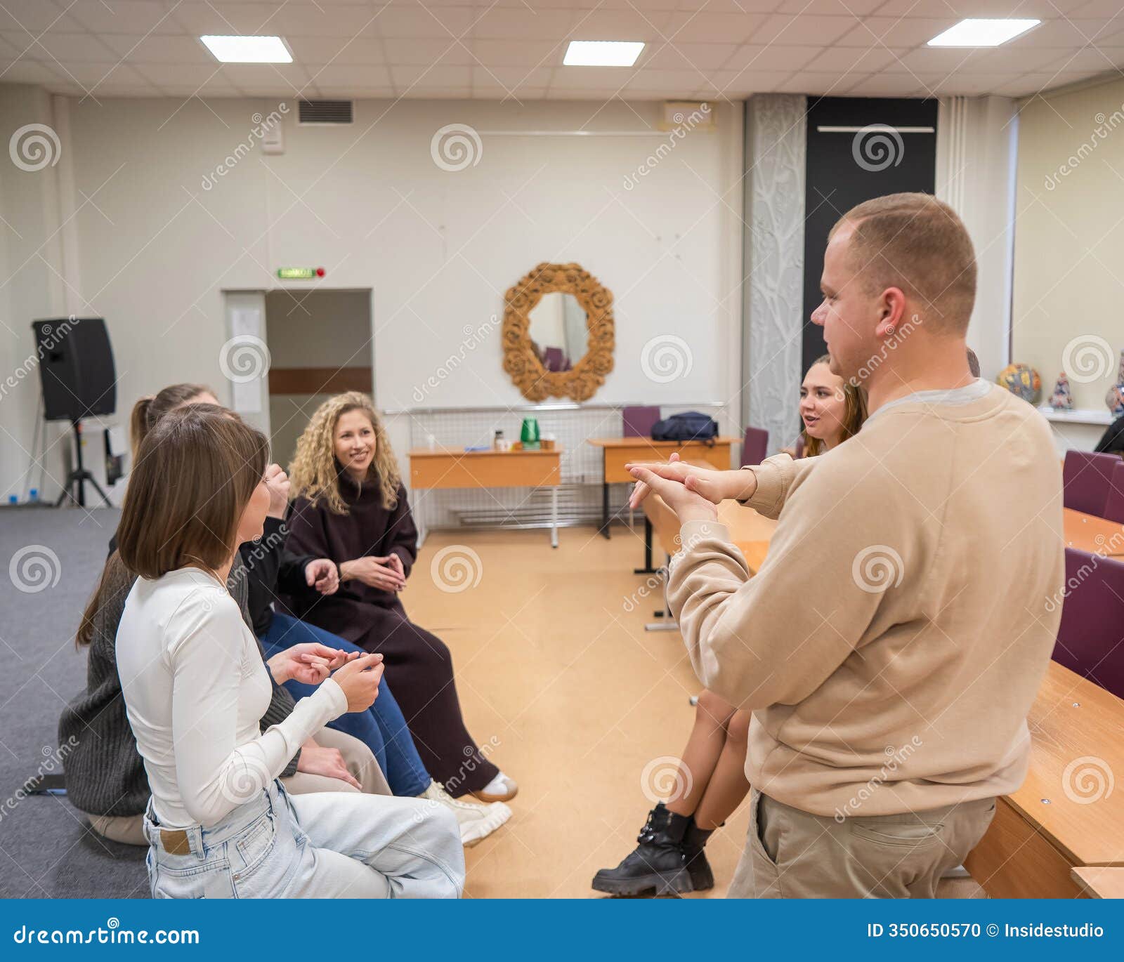 A Group of Young People Talking in Sign Language. Stock Photo - Image ...
