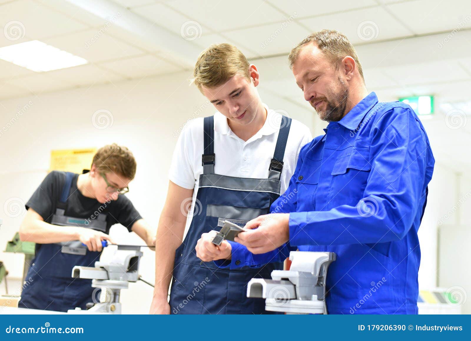 Group of Young People in Technical Vocational Training with Teacher ...