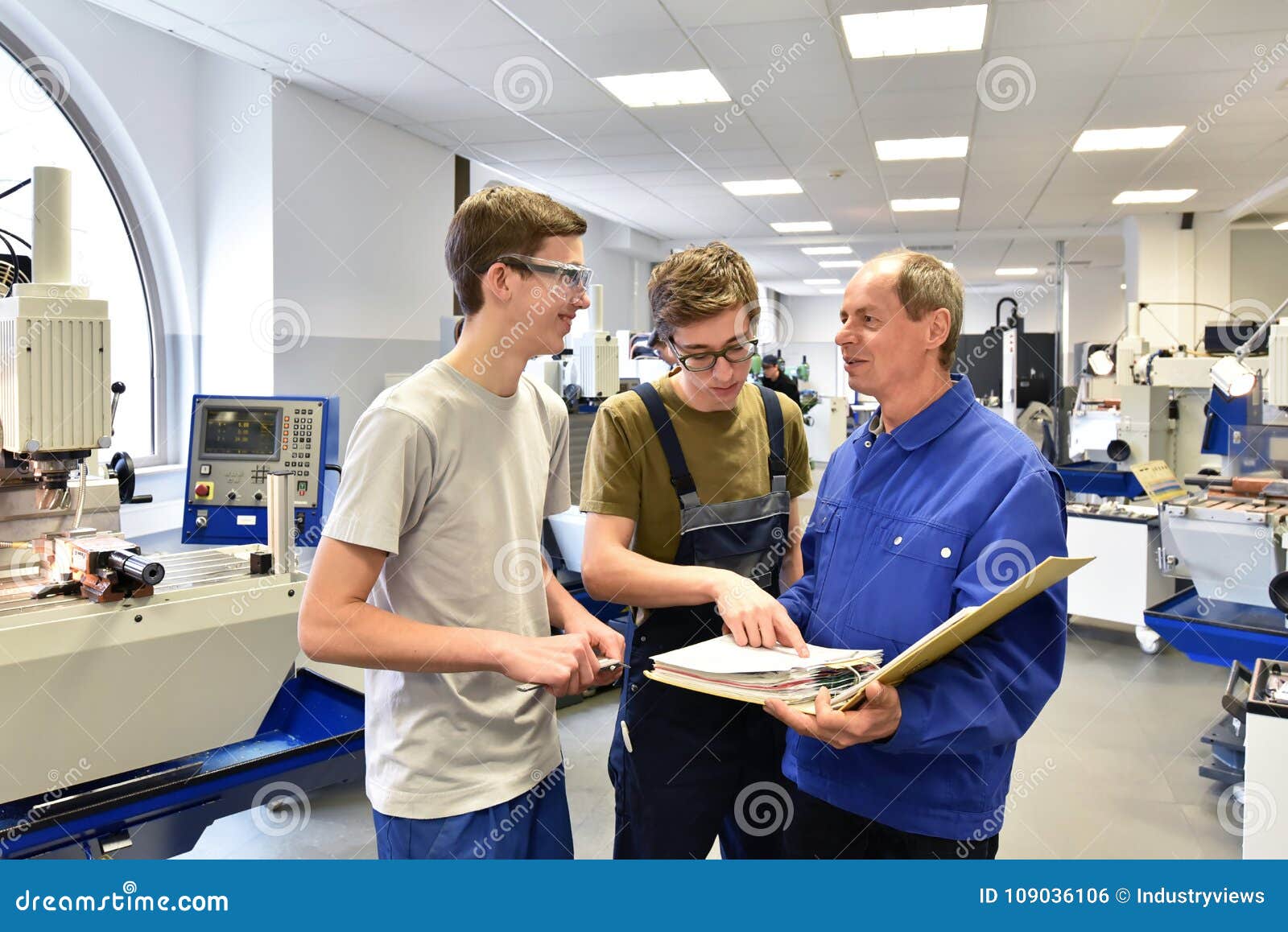 Group of Young People in Technical Vocational Training with Teacher ...