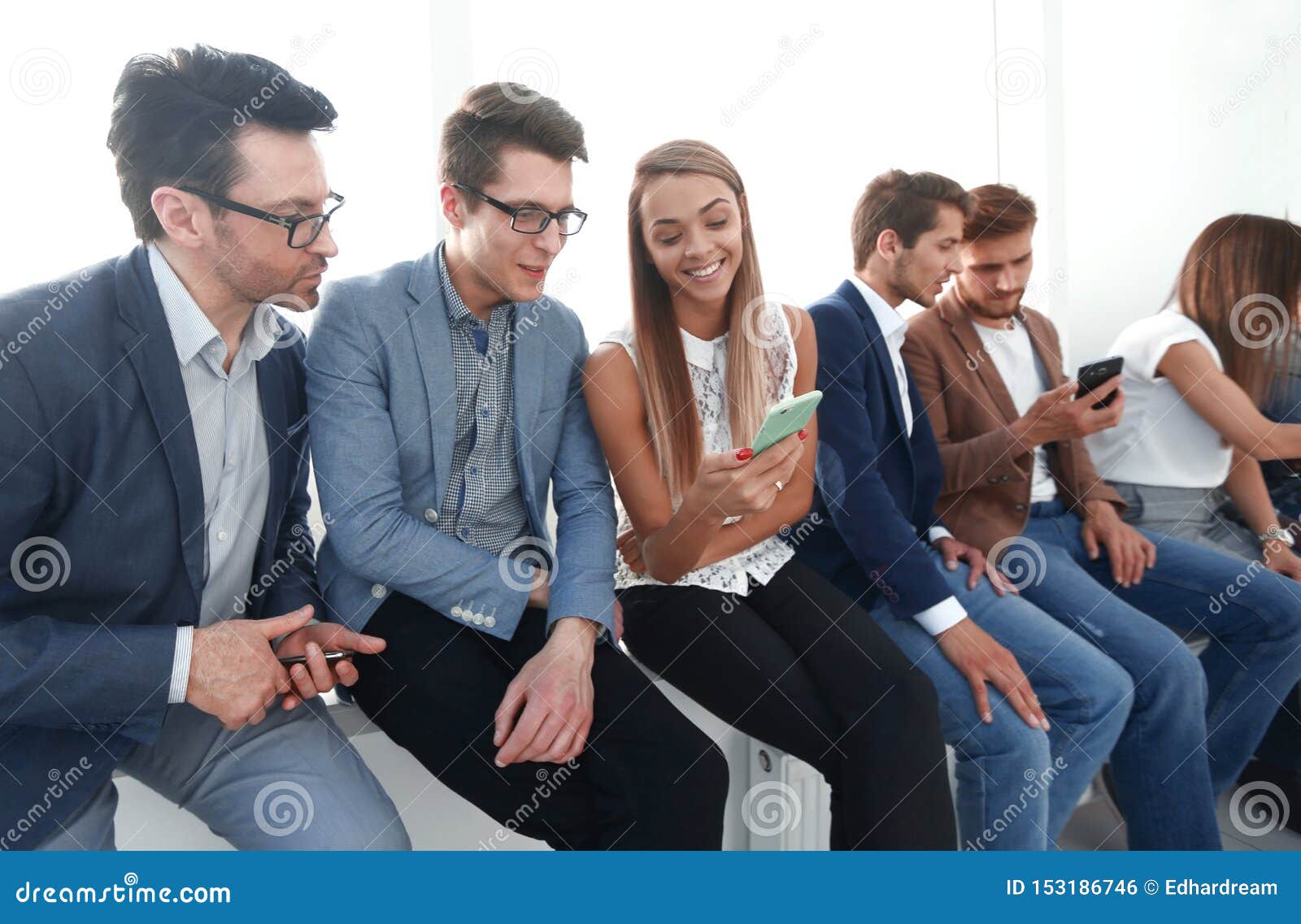 Group of Young People Use Their Smartphones Stock Photo - Image of ...