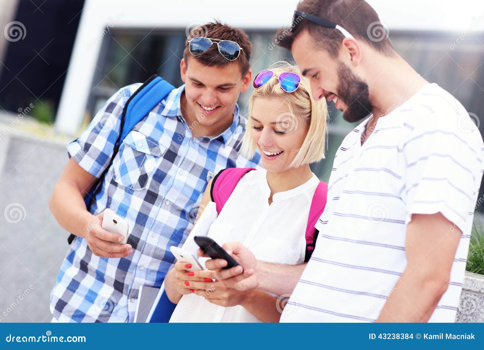 Group of Young People Using Smartphones Stock Photo - Image of showing ...