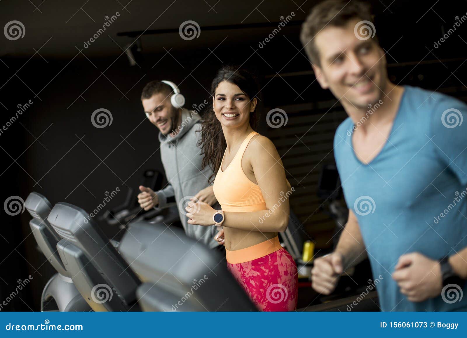 Young People Using Threadmill in Modern Gym Stock Image - Image of ...