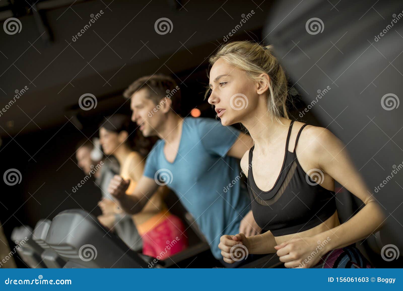 Young People Using Threadmill in Modern Gym Stock Image - Image of ...