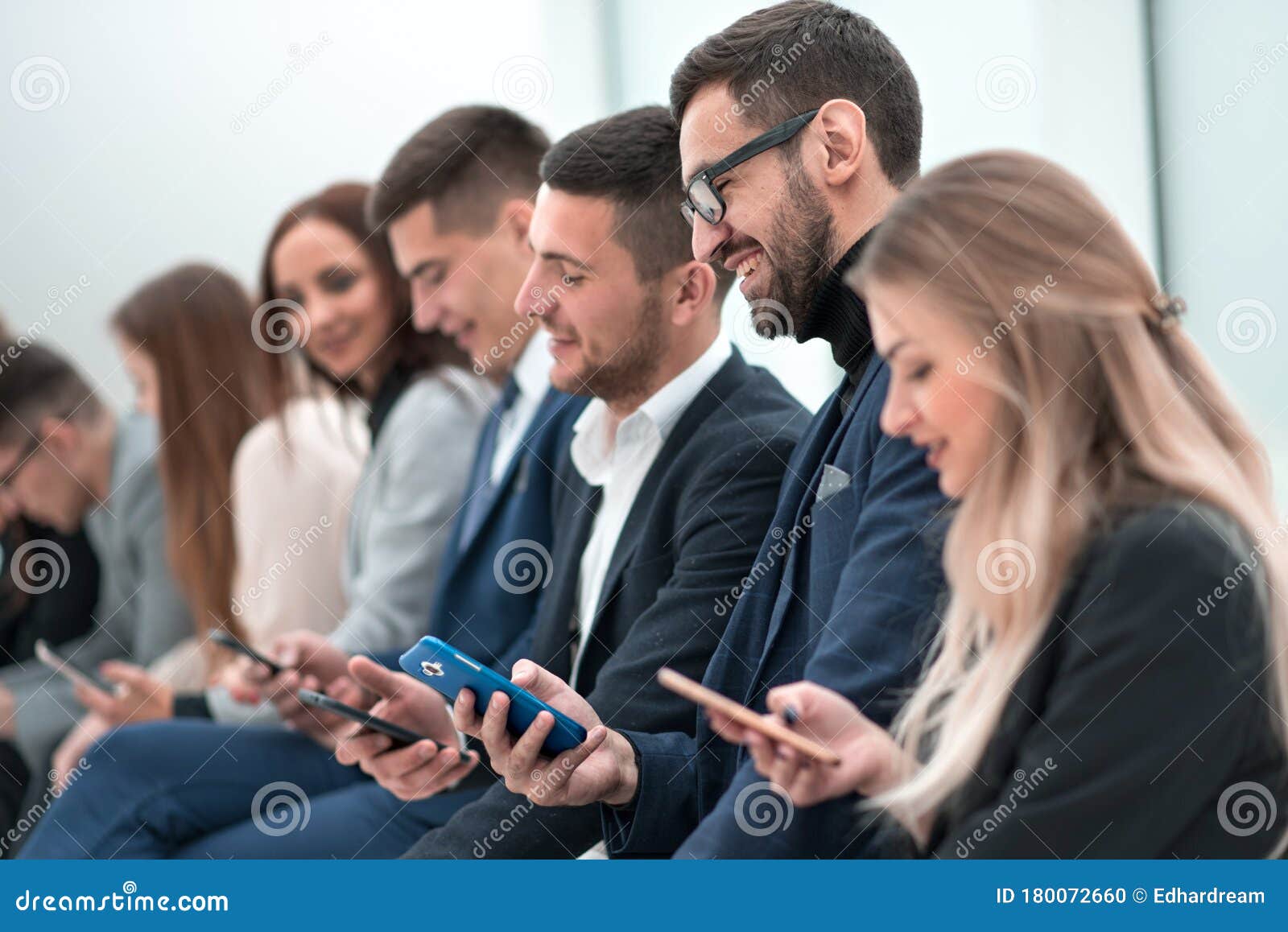 Group of Young People Waiting, Sitting in the Queue Stock Photo - Image ...