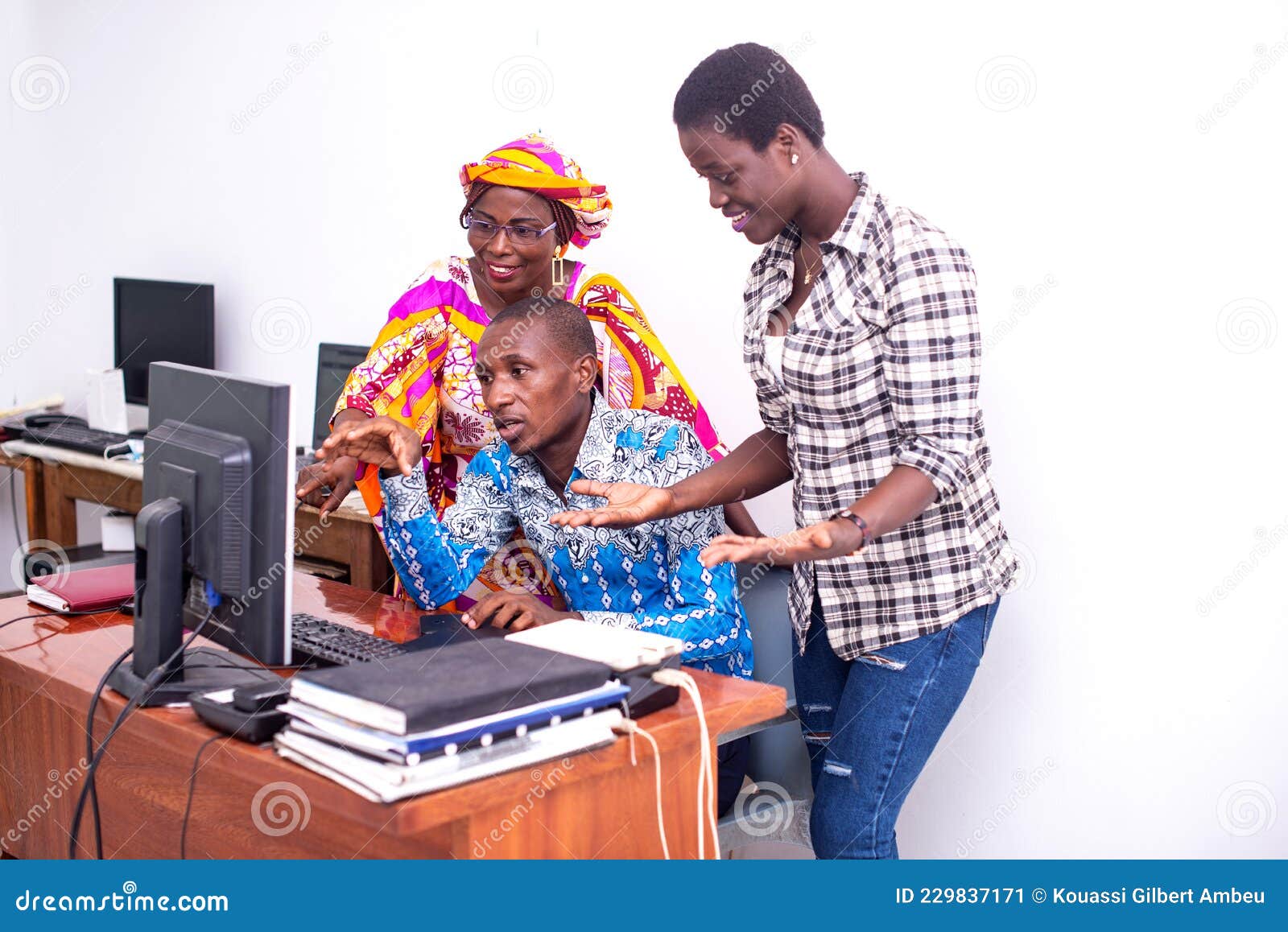 Group of Young People with Computer in an Office, Smiling Stock Image ...