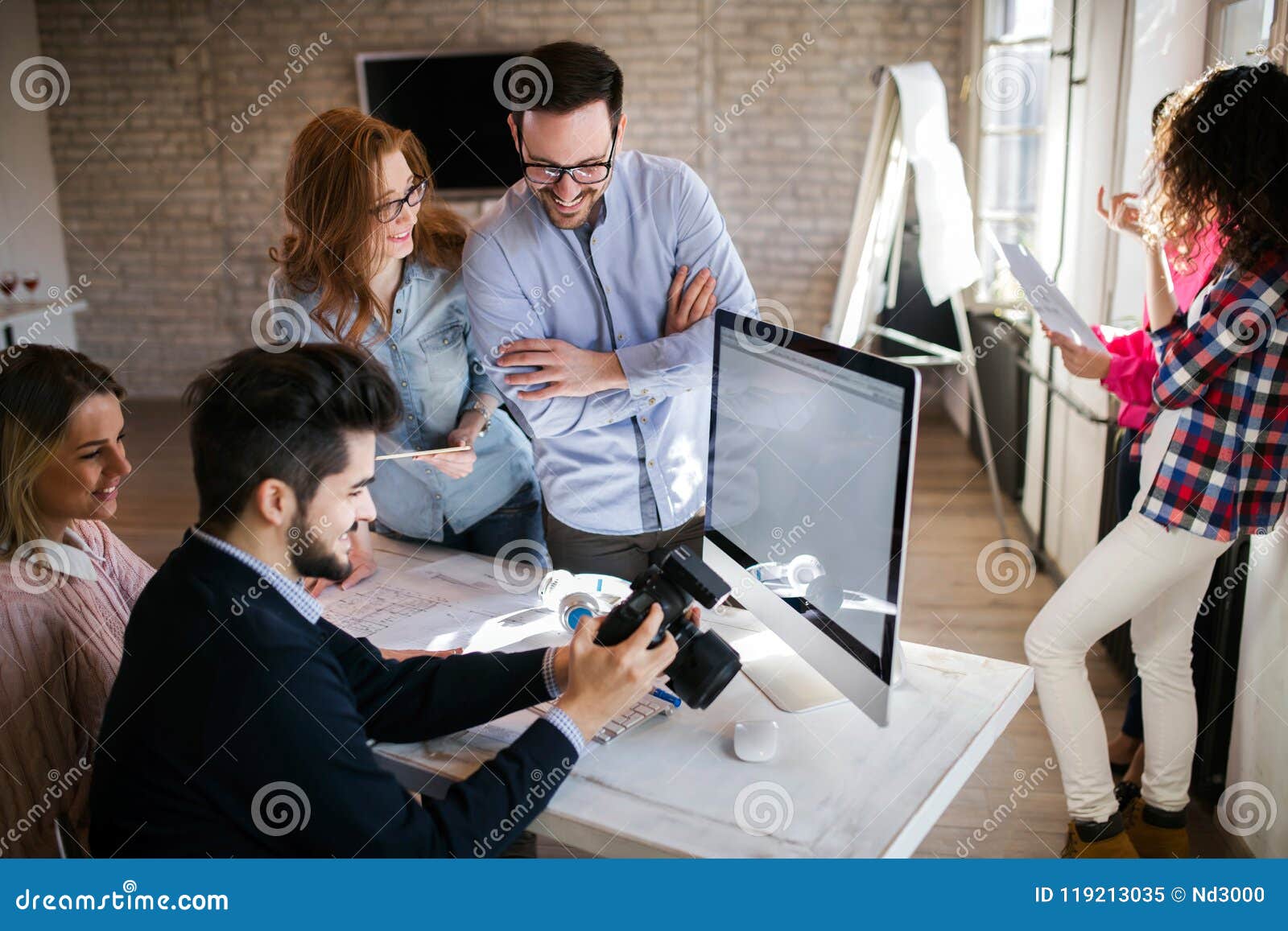 Group of Young Perspective Designers Working with Camera Stock Image ...