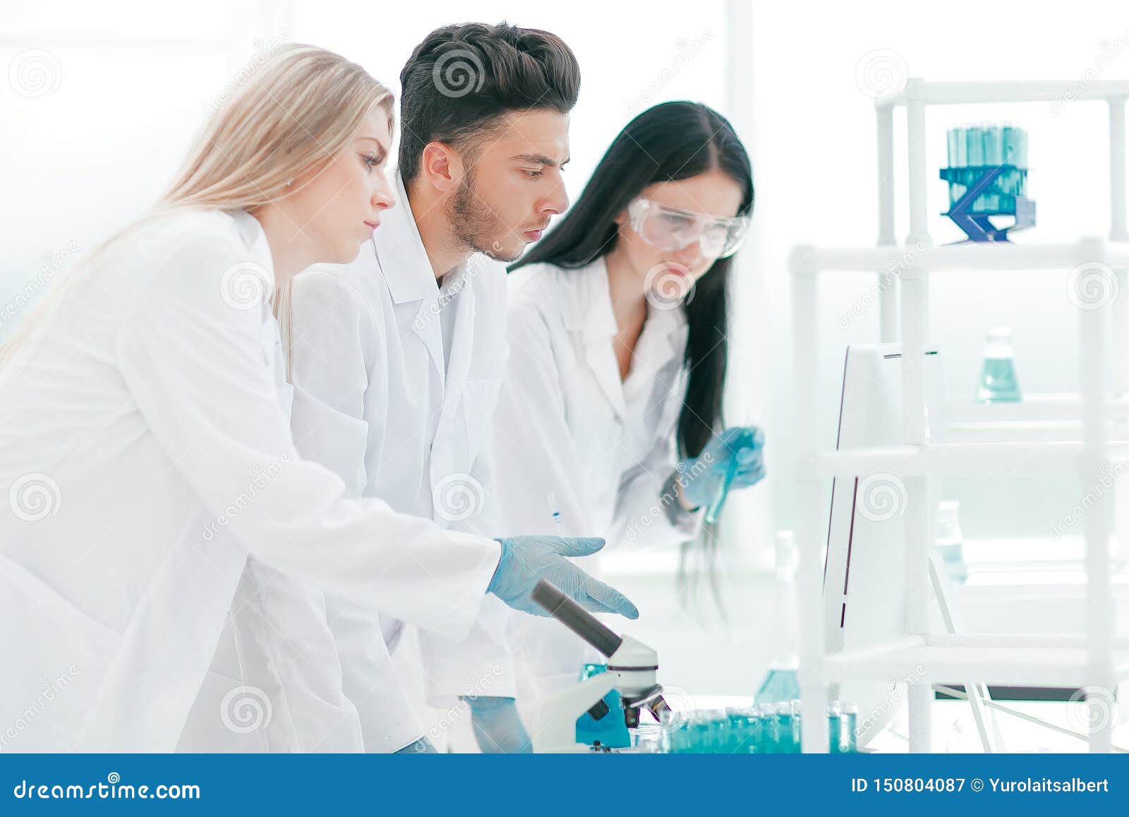 Group of Young Scientist Discussing Something in Their Lab Stock Image ...