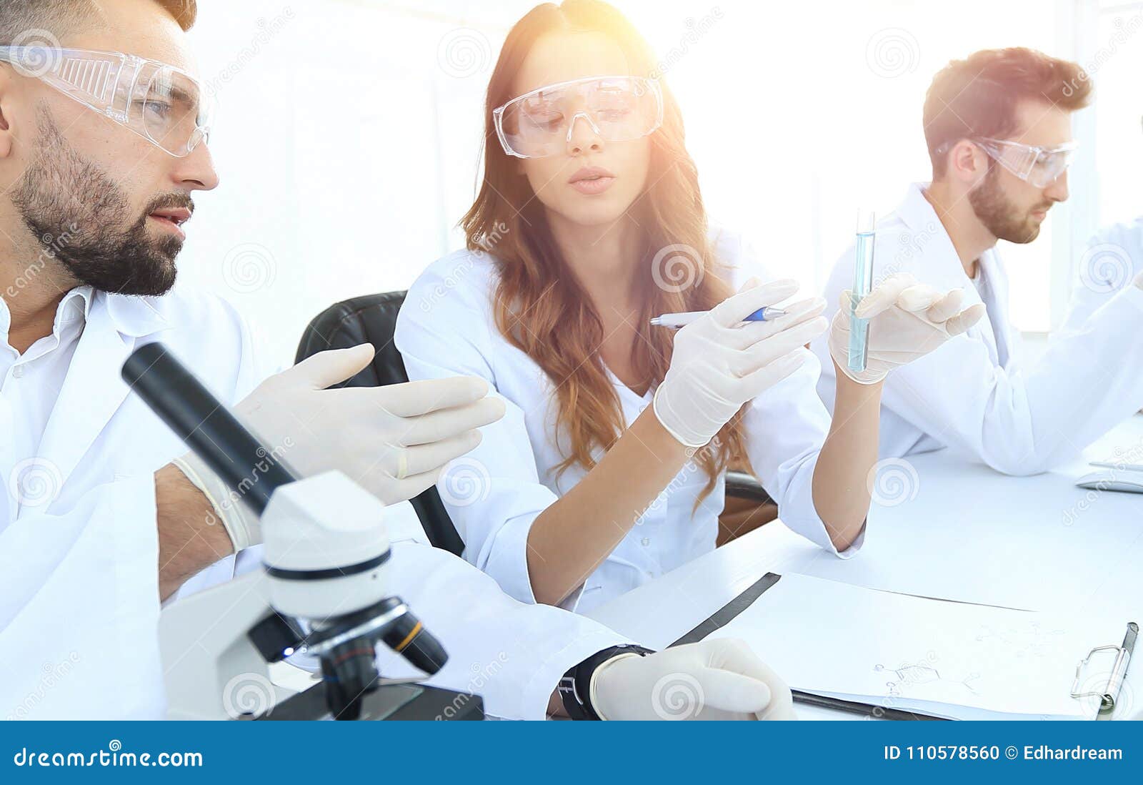 Group of Young Scientists Discussing the Results of a Study Stock Photo ...