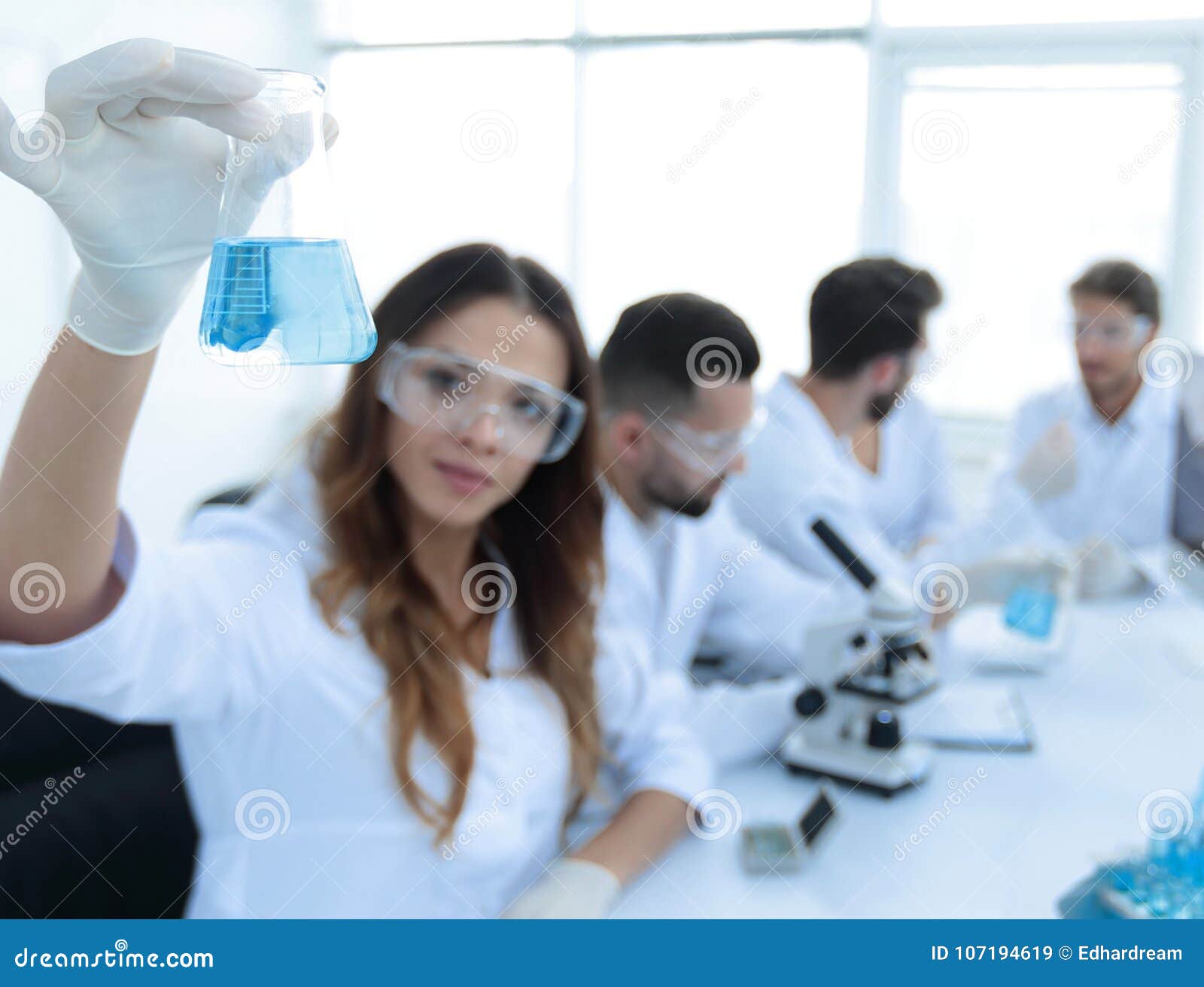Group of Young Scientists Working in the Laboratory. Stock Image ...