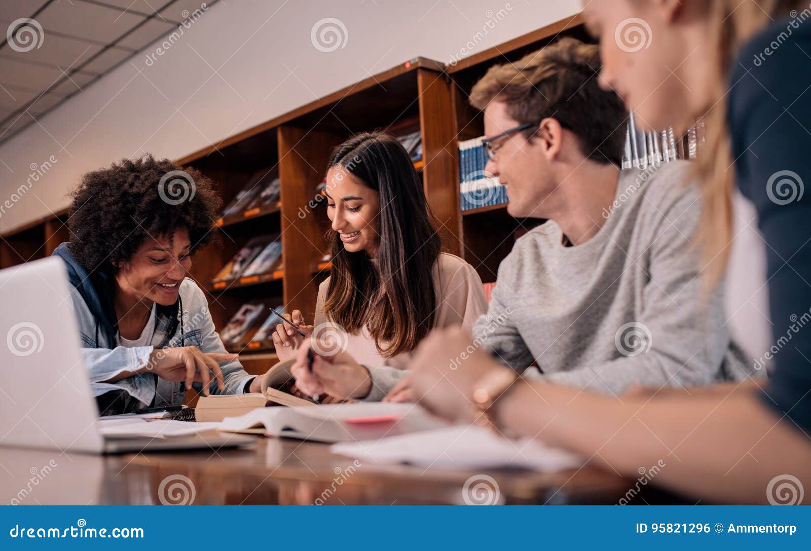 Group of Young Students Doing Assignment Stock Photo - Image of ...