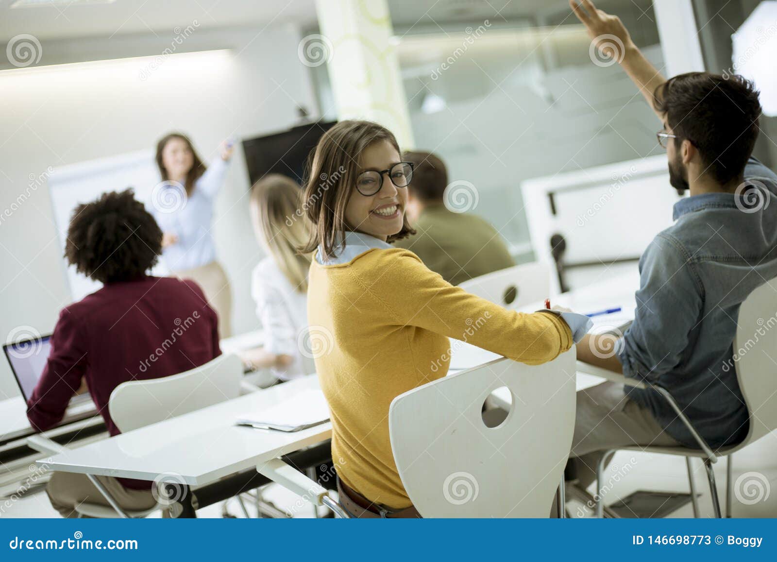 Students Rising Hands To Answer the Question during the Workshop ...