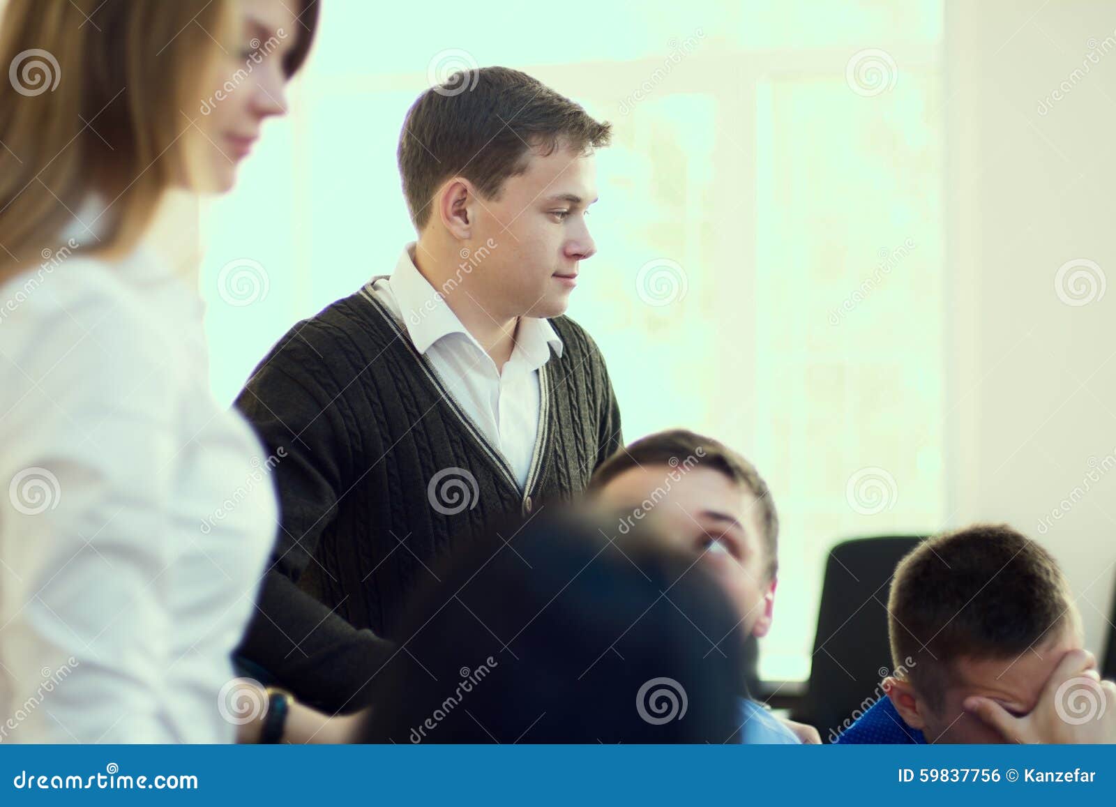A Group of Young Students Solve a Problem Stock Photo - Image of ...