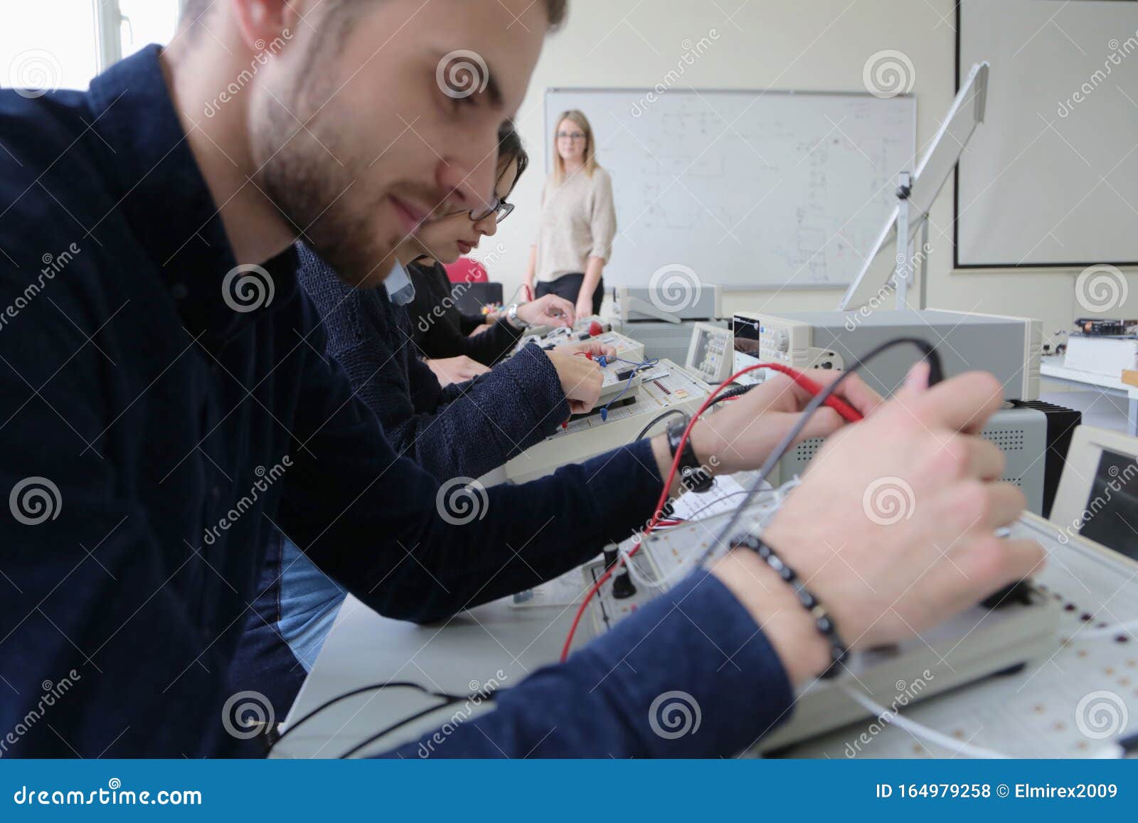 Group of Young Students in Technical Vocational Training with Teacher ...