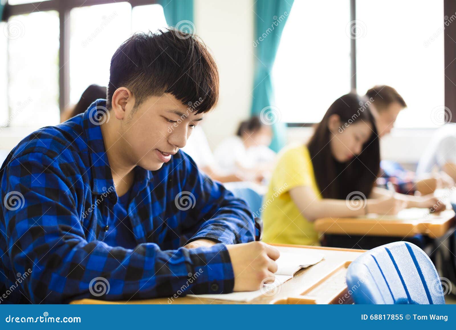 Group of Young Students Writing Notes in the Classroom Stock Image ...