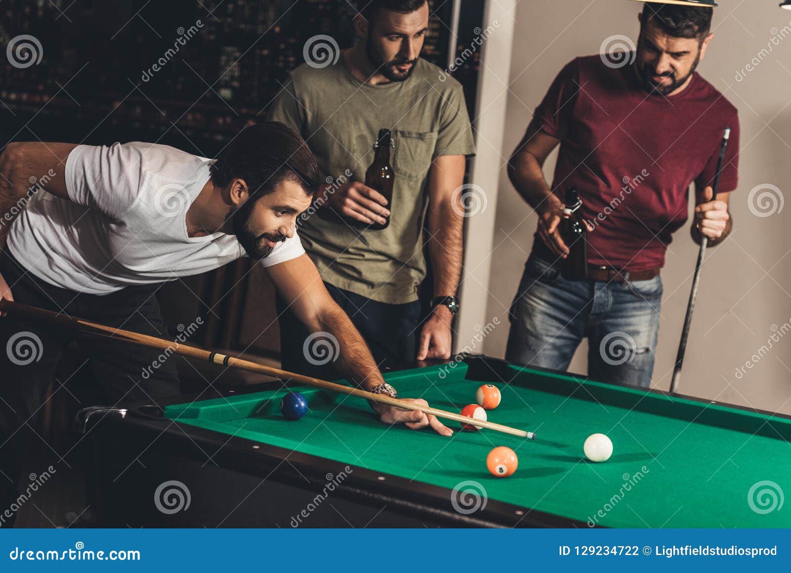 Group of Young Successful Handsome Men Playing in Pool Stock Photo ...
