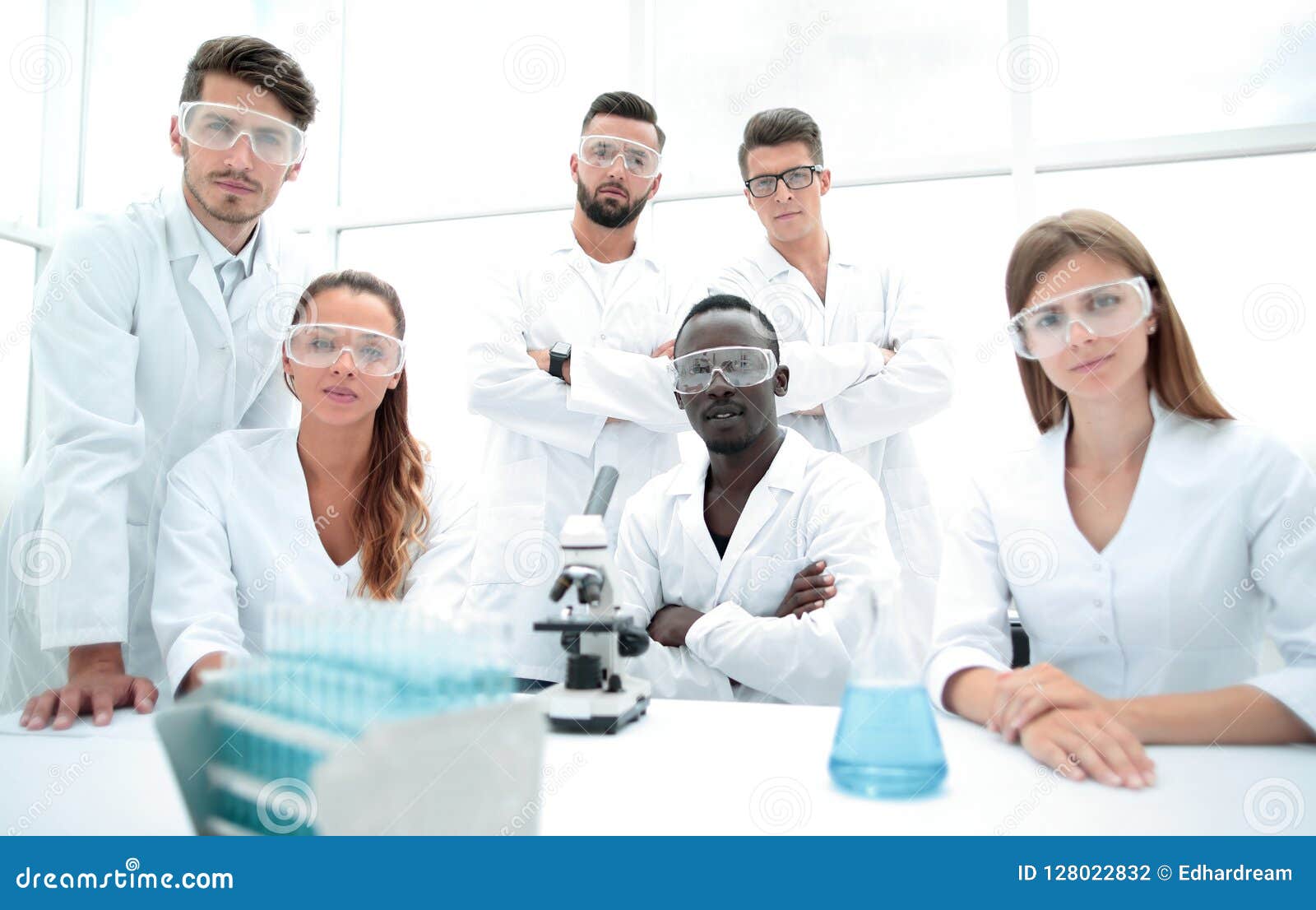 Group of Young Successful Scientists Posing for Camera Stock Photo ...