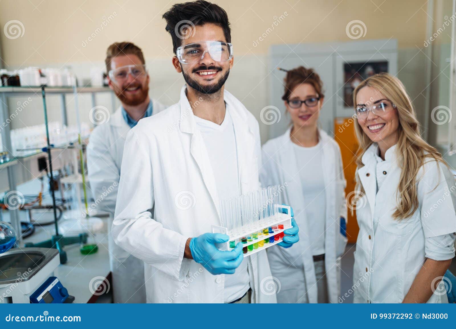 Group of Young Successful Scientists Posing for Camera Stock Photo ...