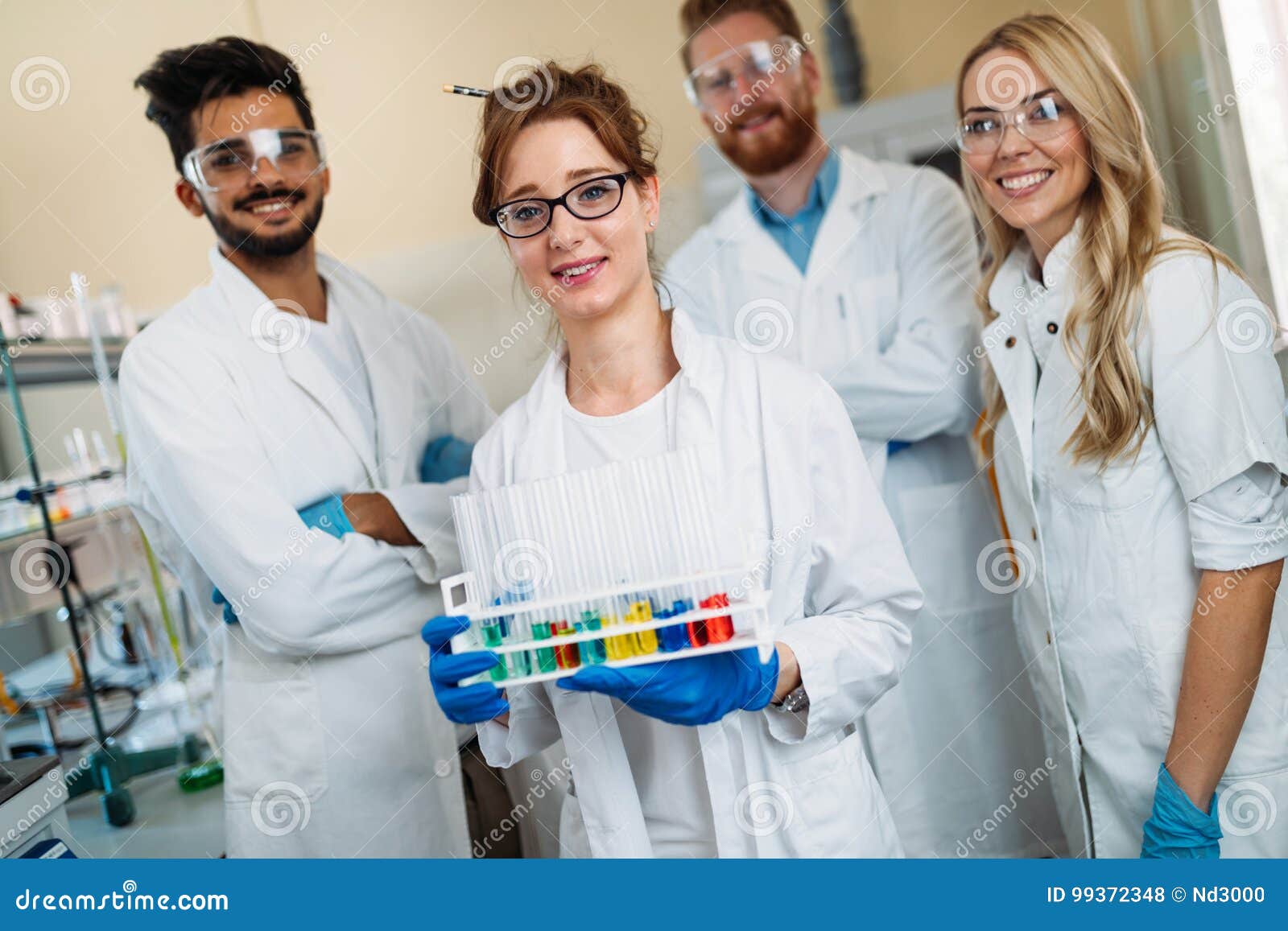 Group of Young Successful Scientists Posing for Camera Stock Photo ...