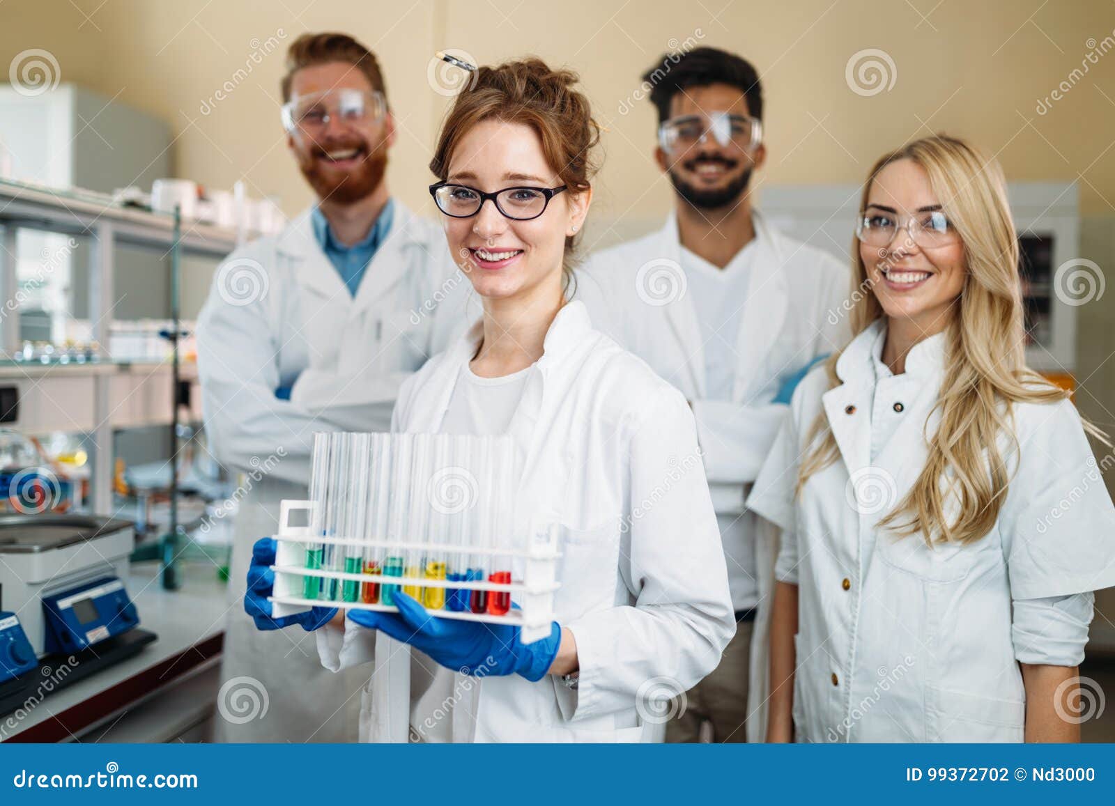 Group of Young Successful Scientists Posing for Camera Stock Photo ...