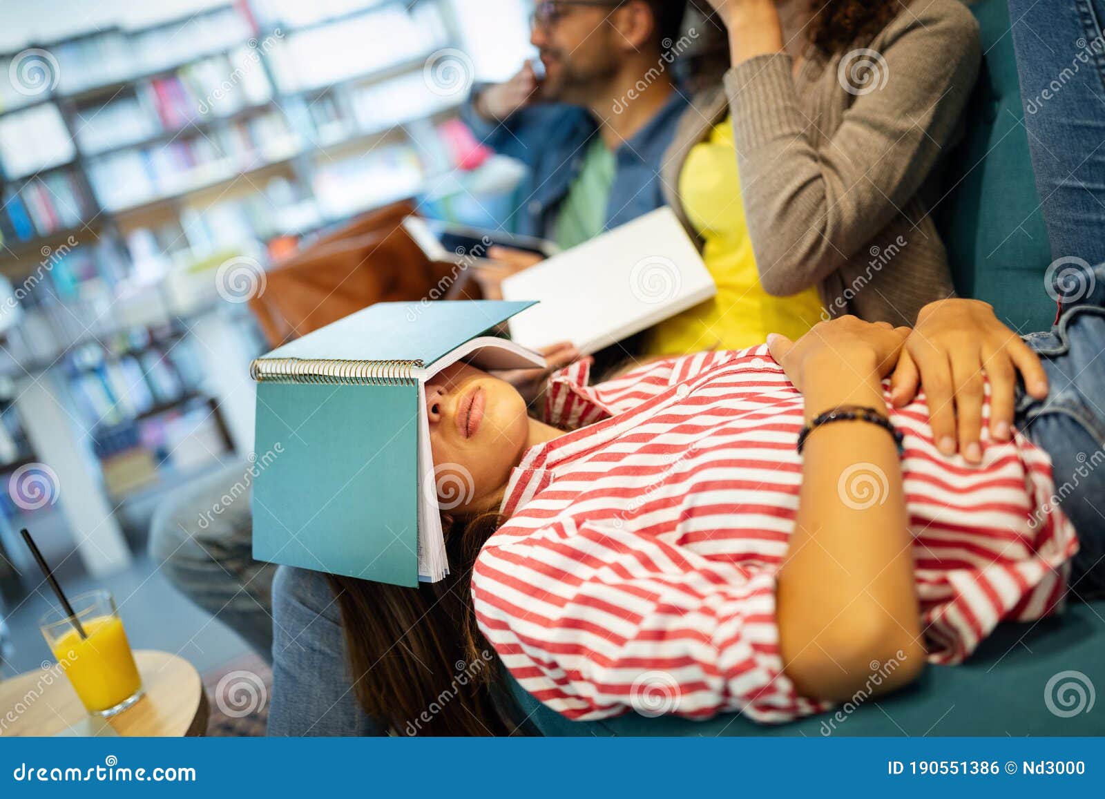 Group of Young Tired Students Studying, Learning for Exam in Library ...