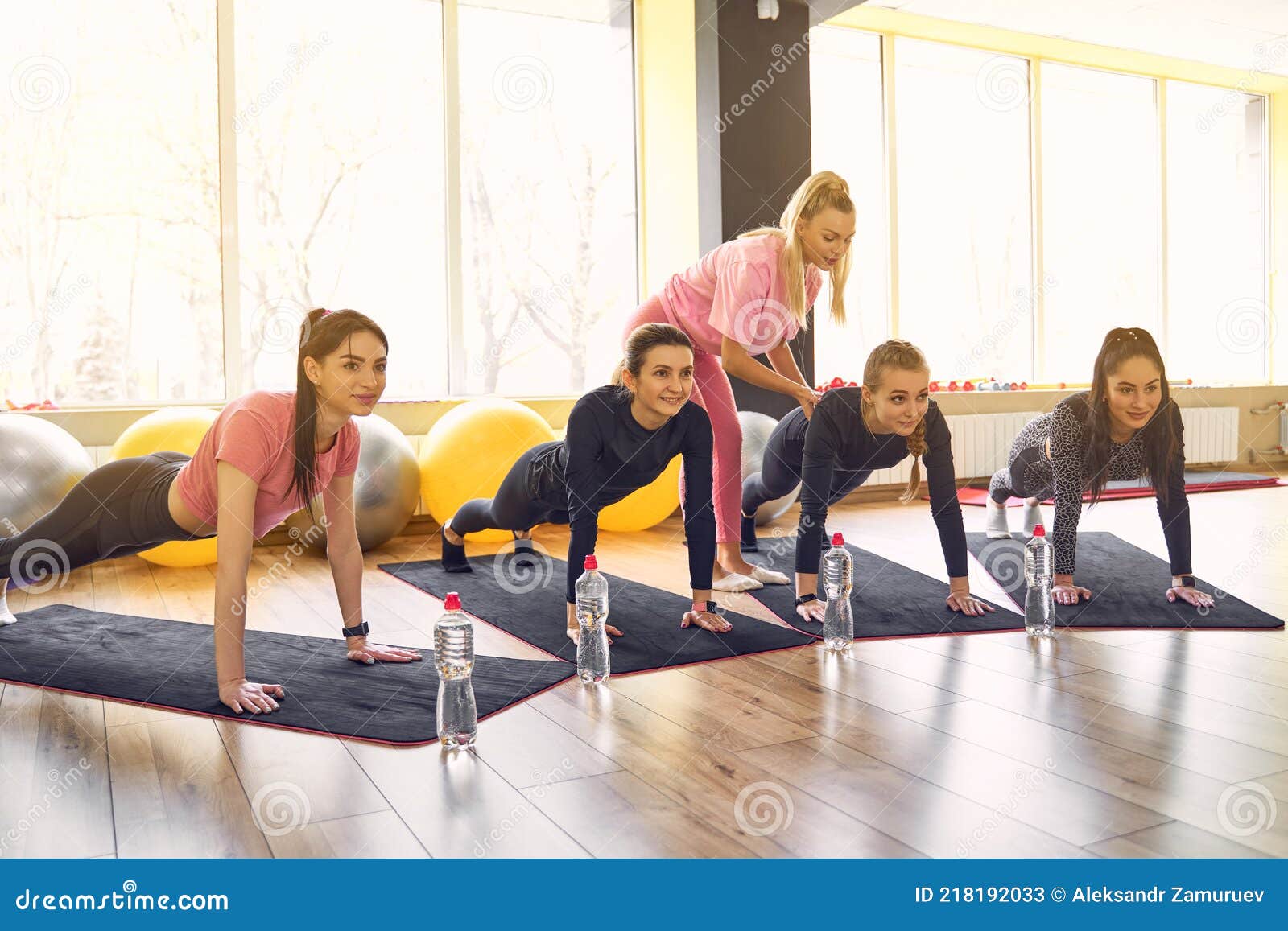 Group of Young Women Doing Plank Together in Gym Stock Image - Image of ...